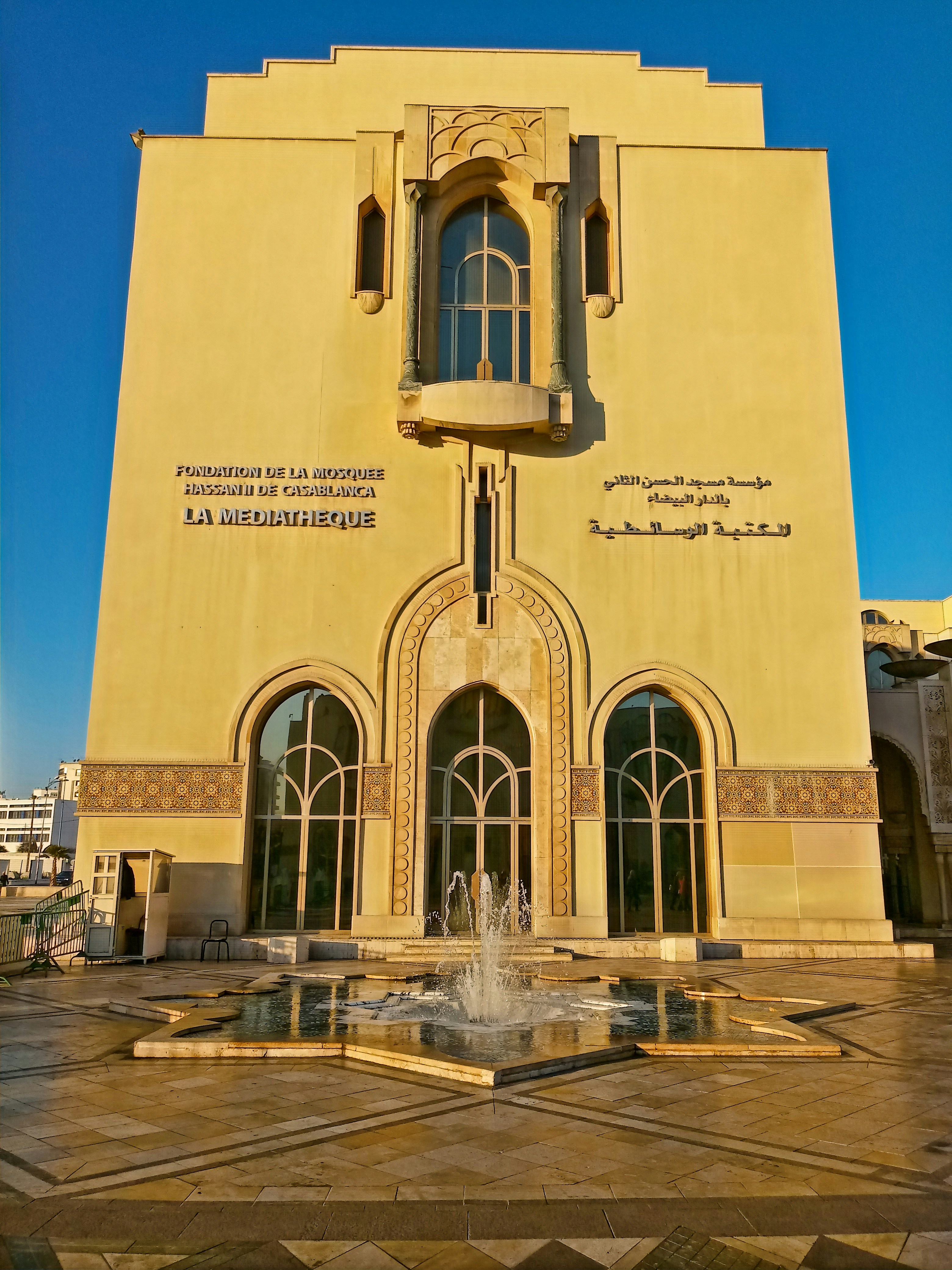 Sunlit Arches and Central Window: La Médiathèque's Quiet Facade