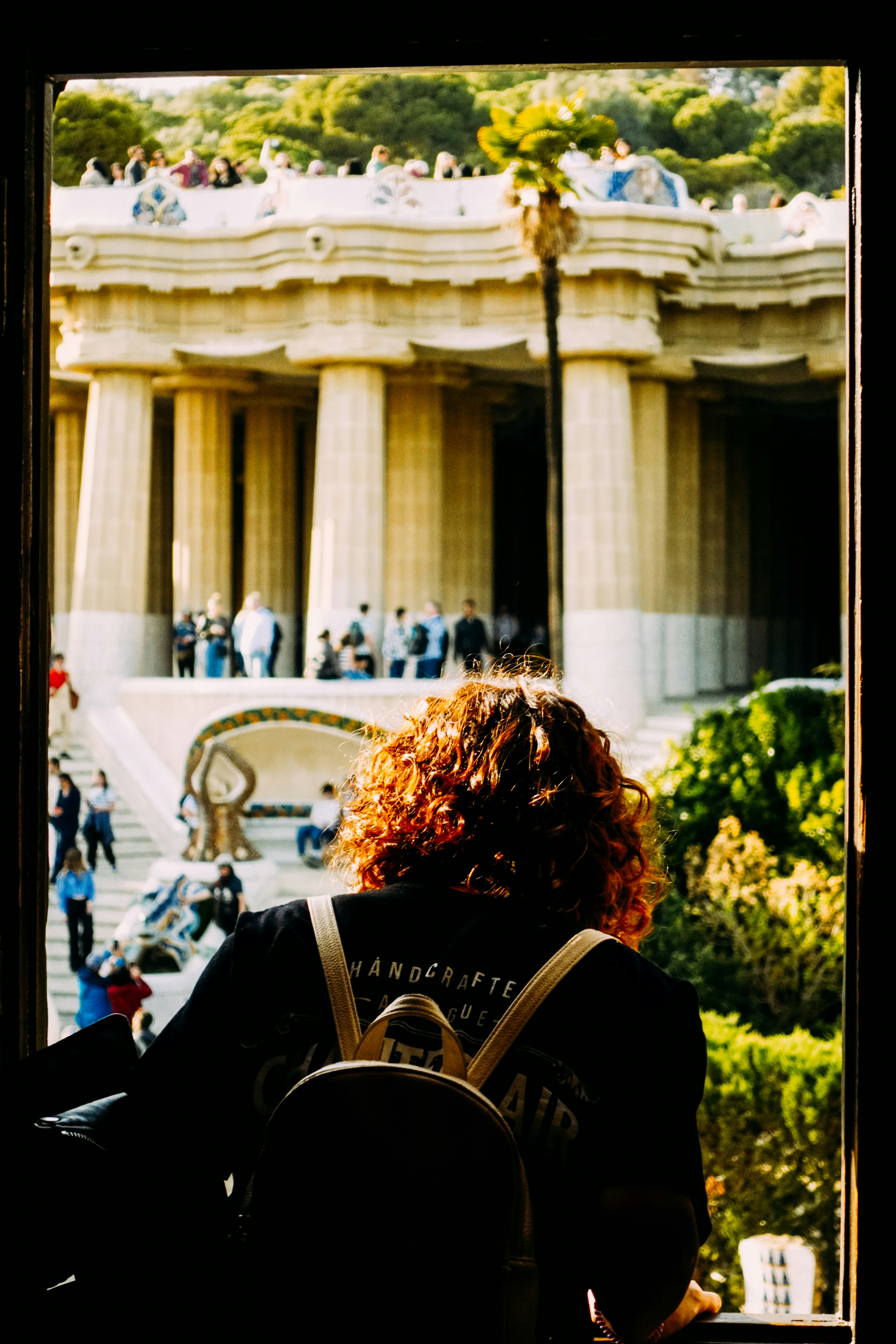 Backlit Traveler with a Historic Dome in the Distance
