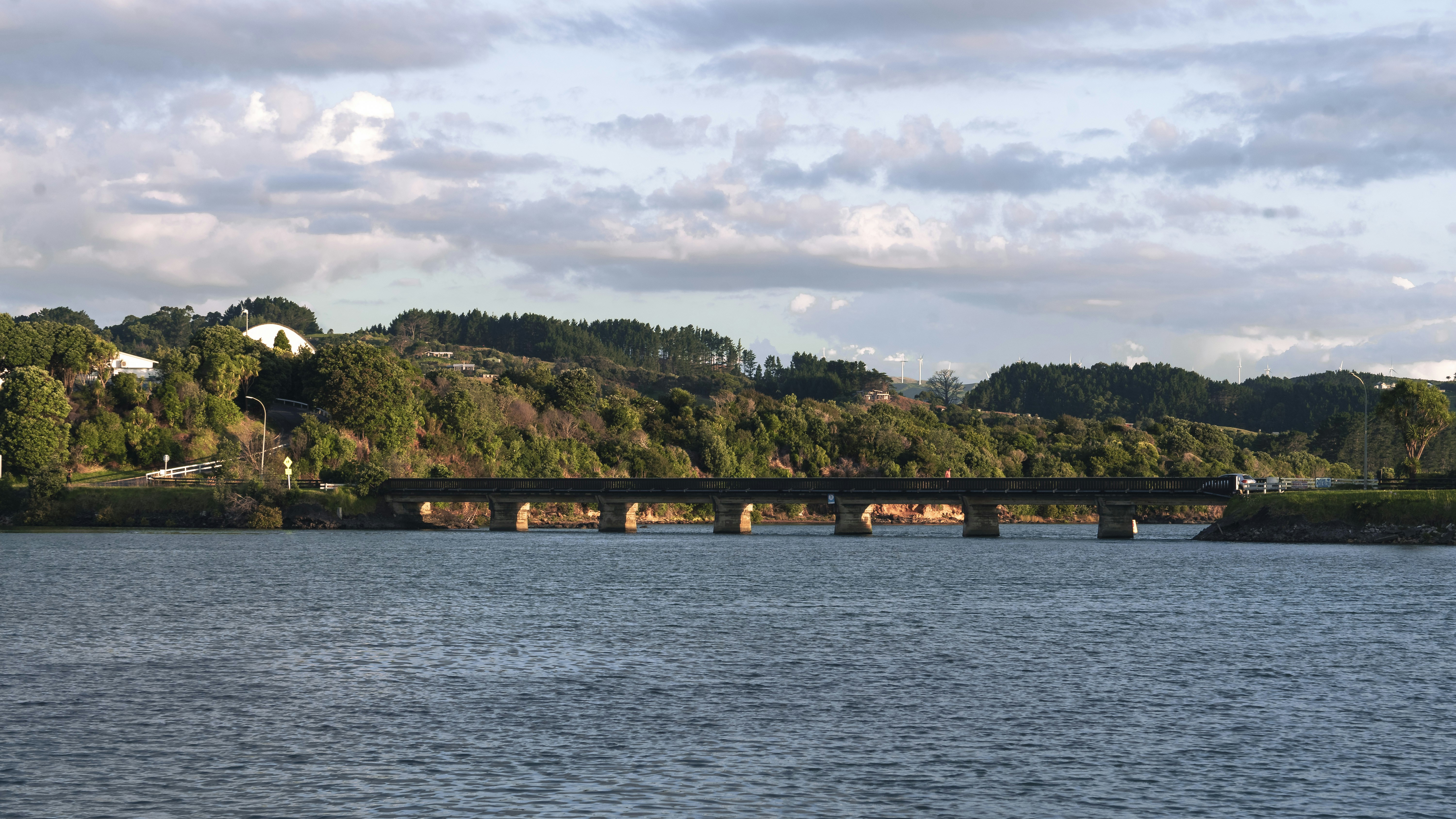 Bridge and River in Dappled Light: A Quiet Riverside Vista