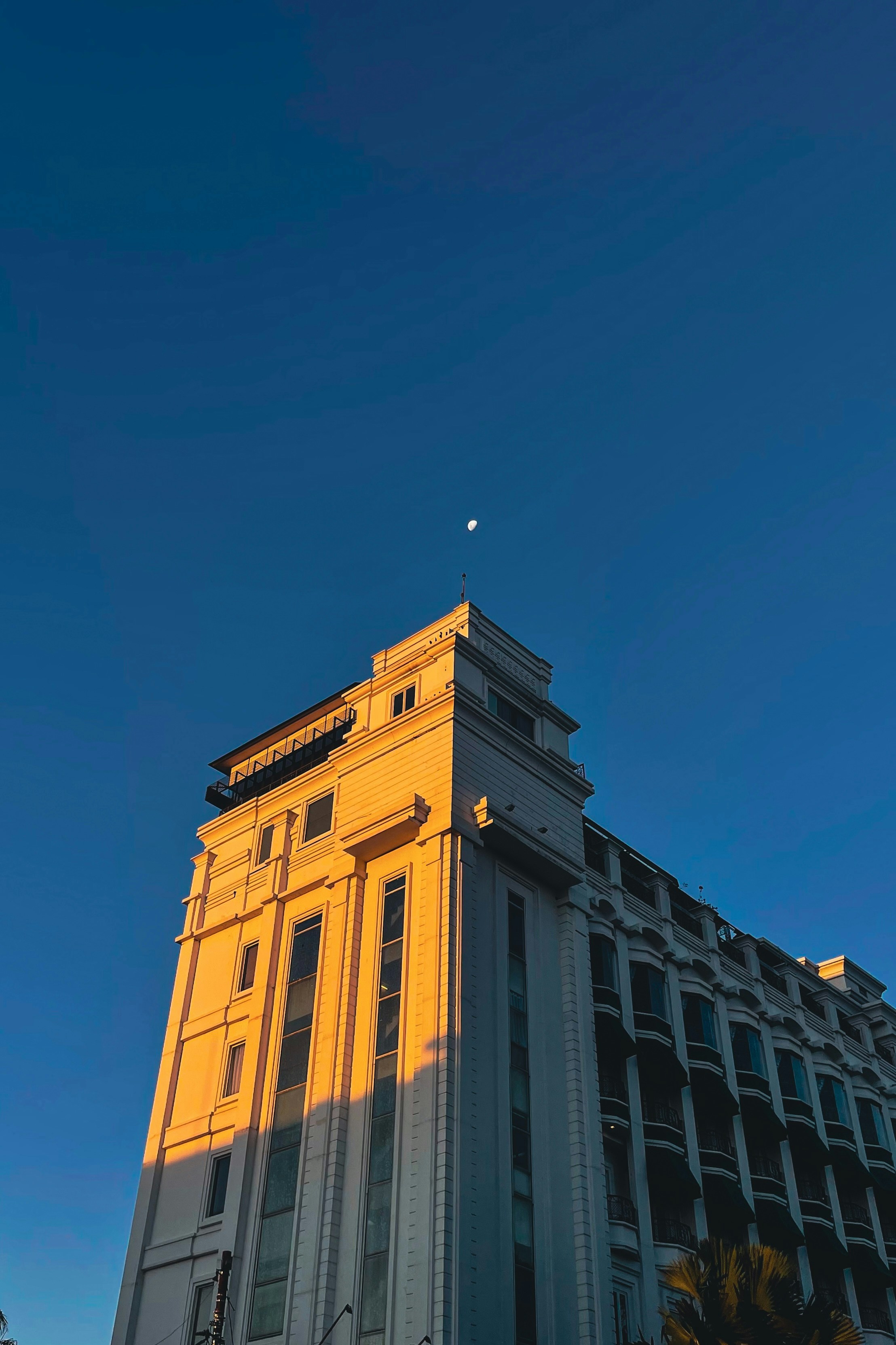 Golden Facade of a Historic Building Bathed in Late Afternoon Light