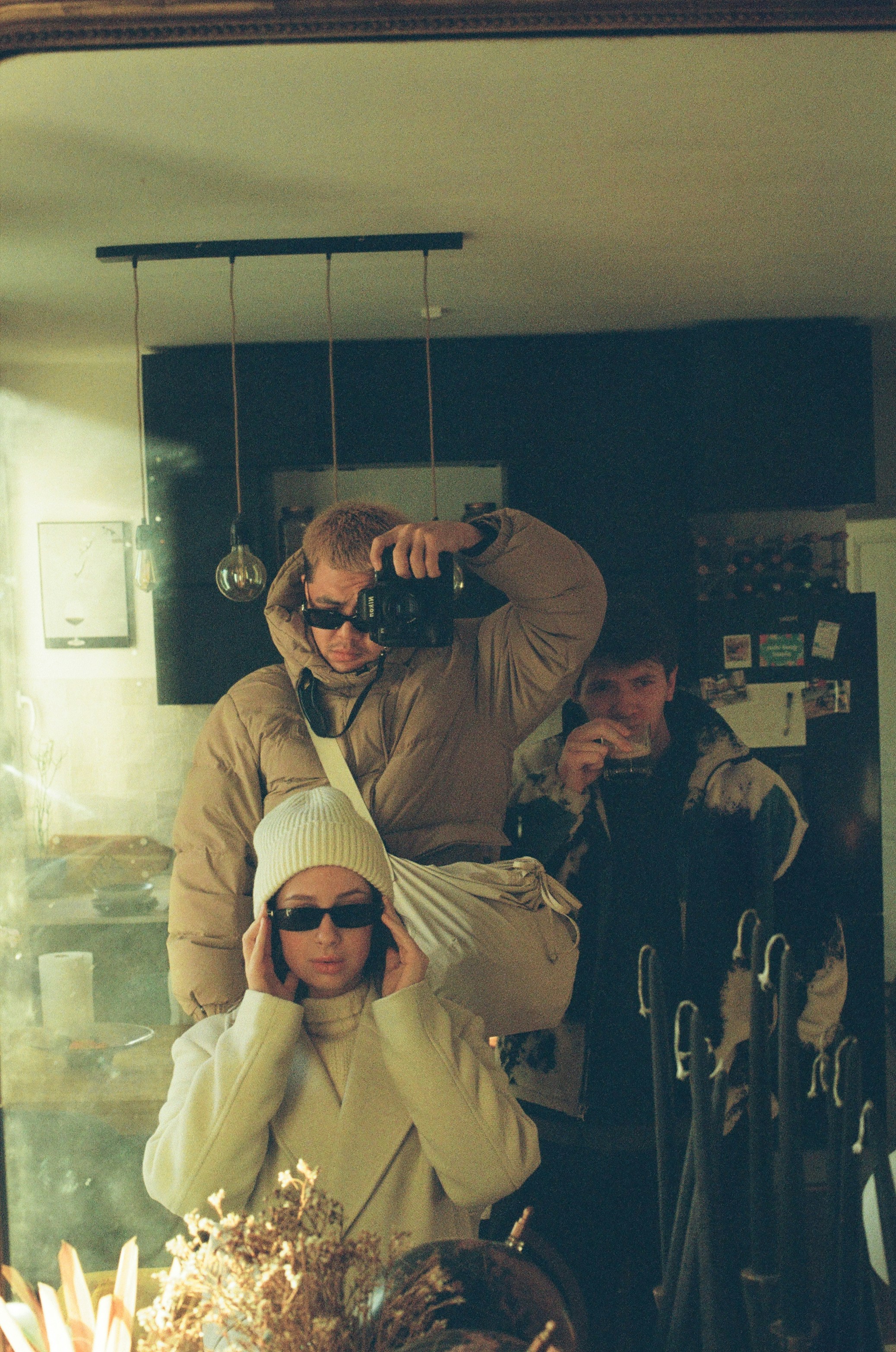 A man taking a picture of a woman with a camera photo – Free Model ...