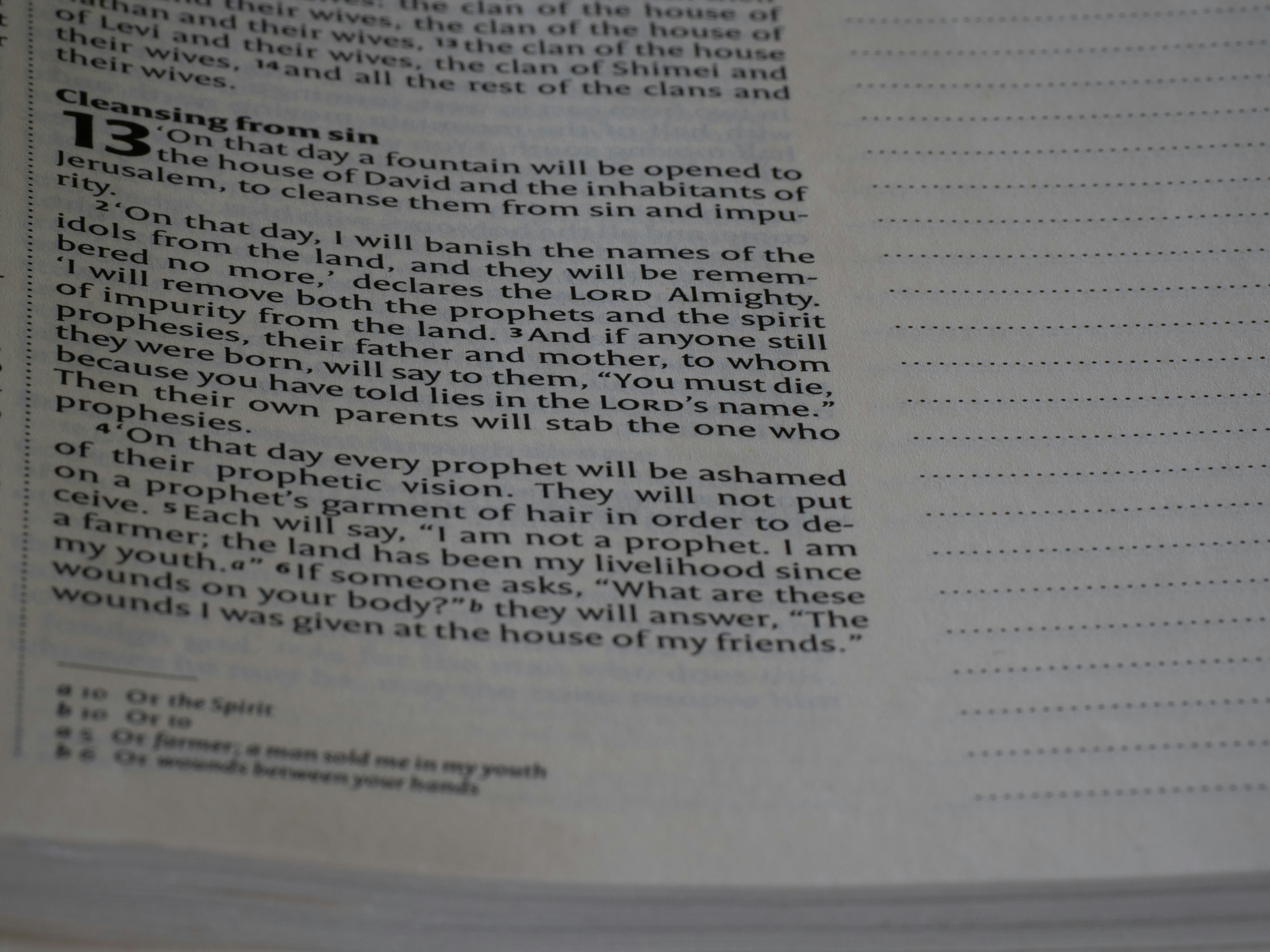 A close up of an open book with text photo – Free Book Image on Unsplash