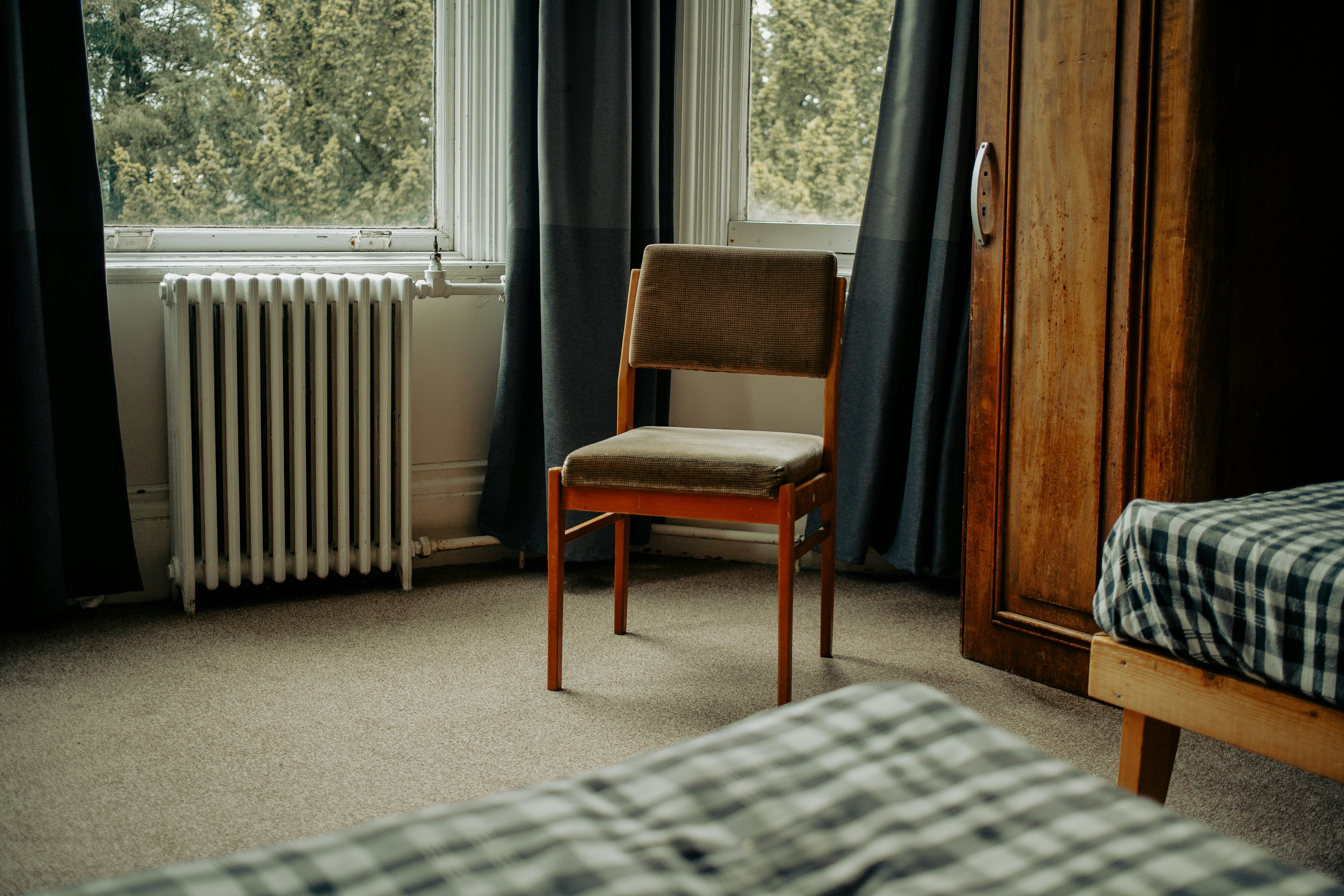 An Empty Chair by the Window: Quiet Morning in a Dormitory