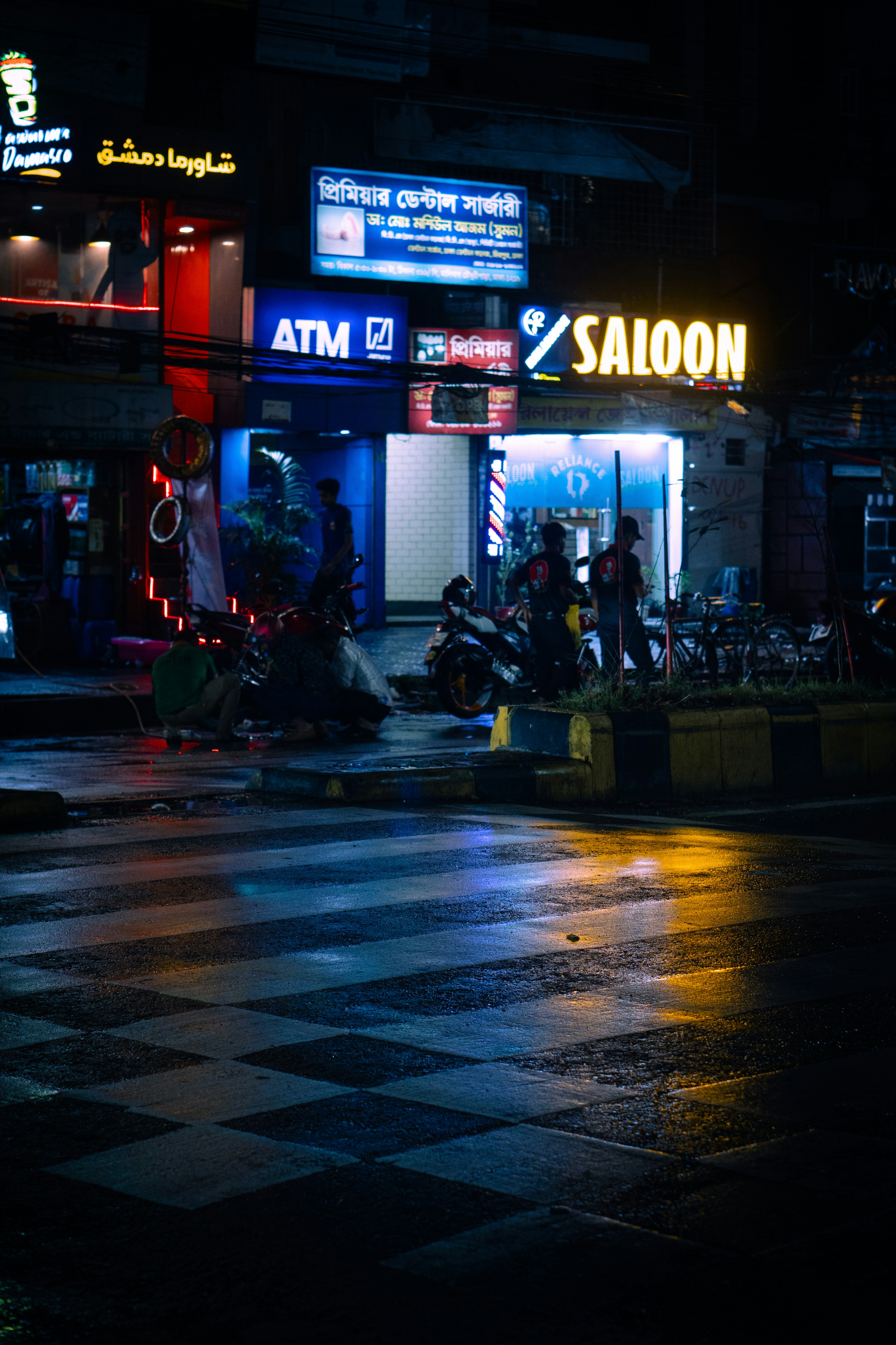 Neon Nightlife at the Rain-Slicked Corner