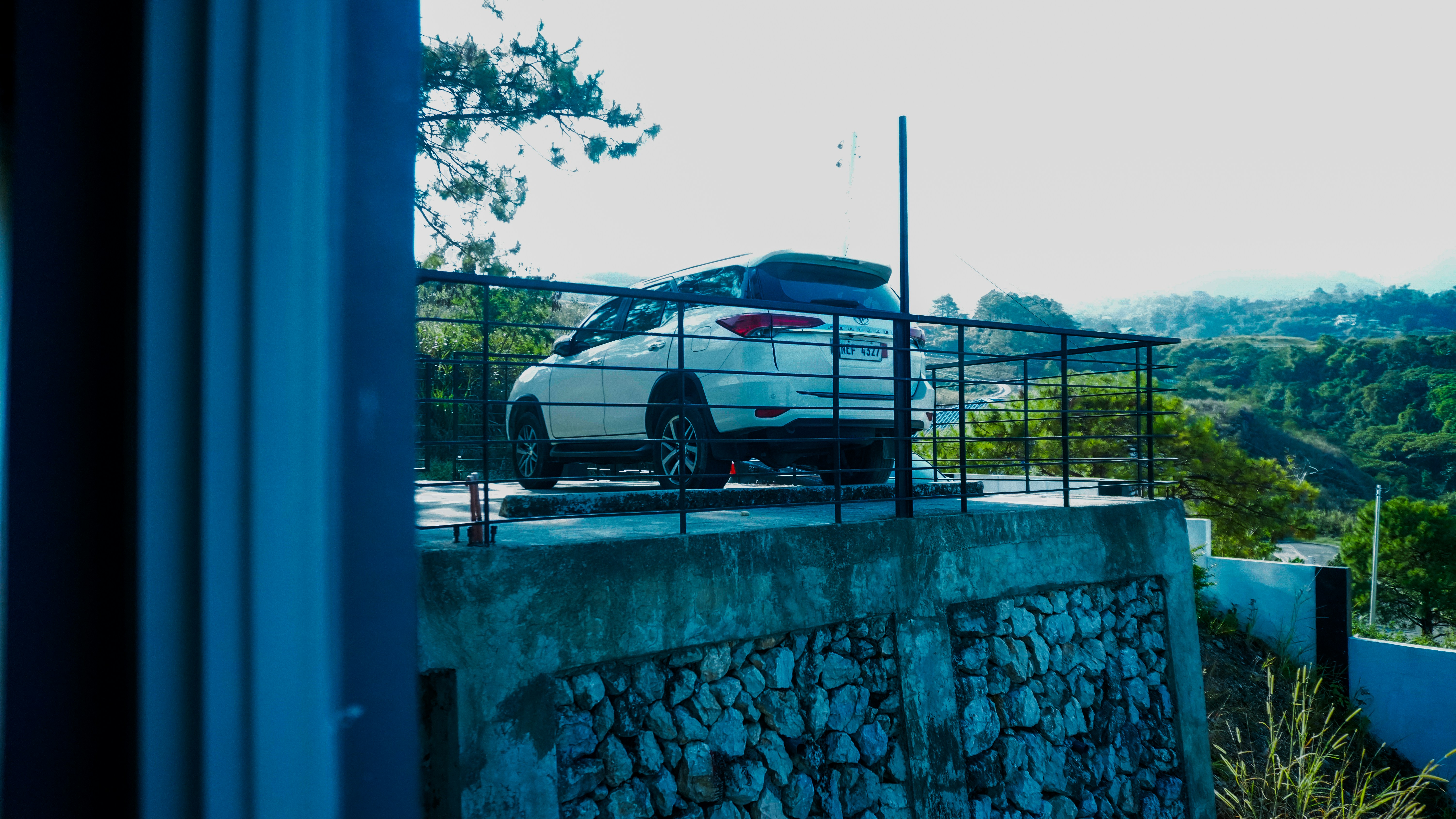 Urban Oasis: Car on the Edge