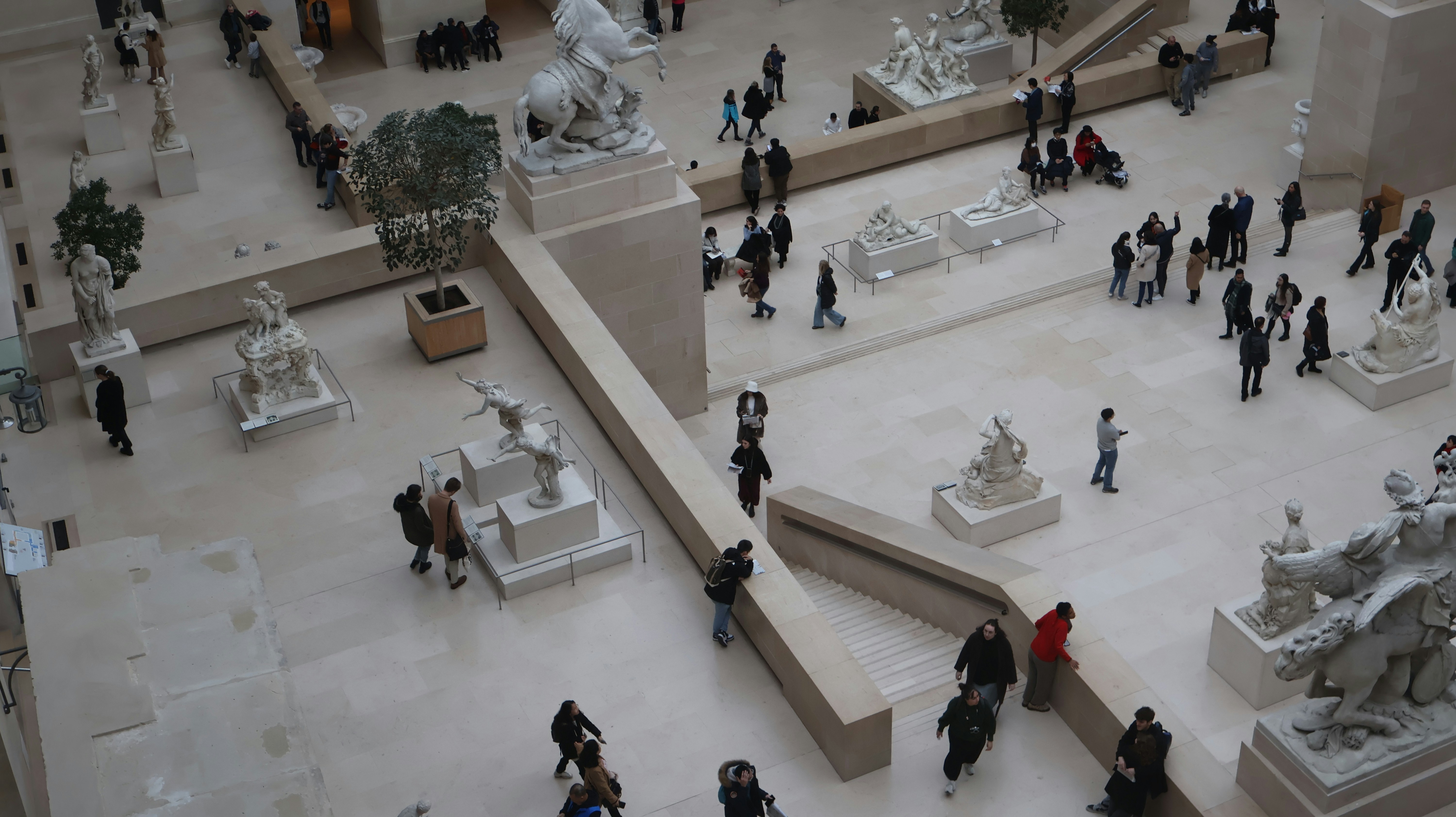 A group of people walking around a museum photo – Free Museum Image on ...