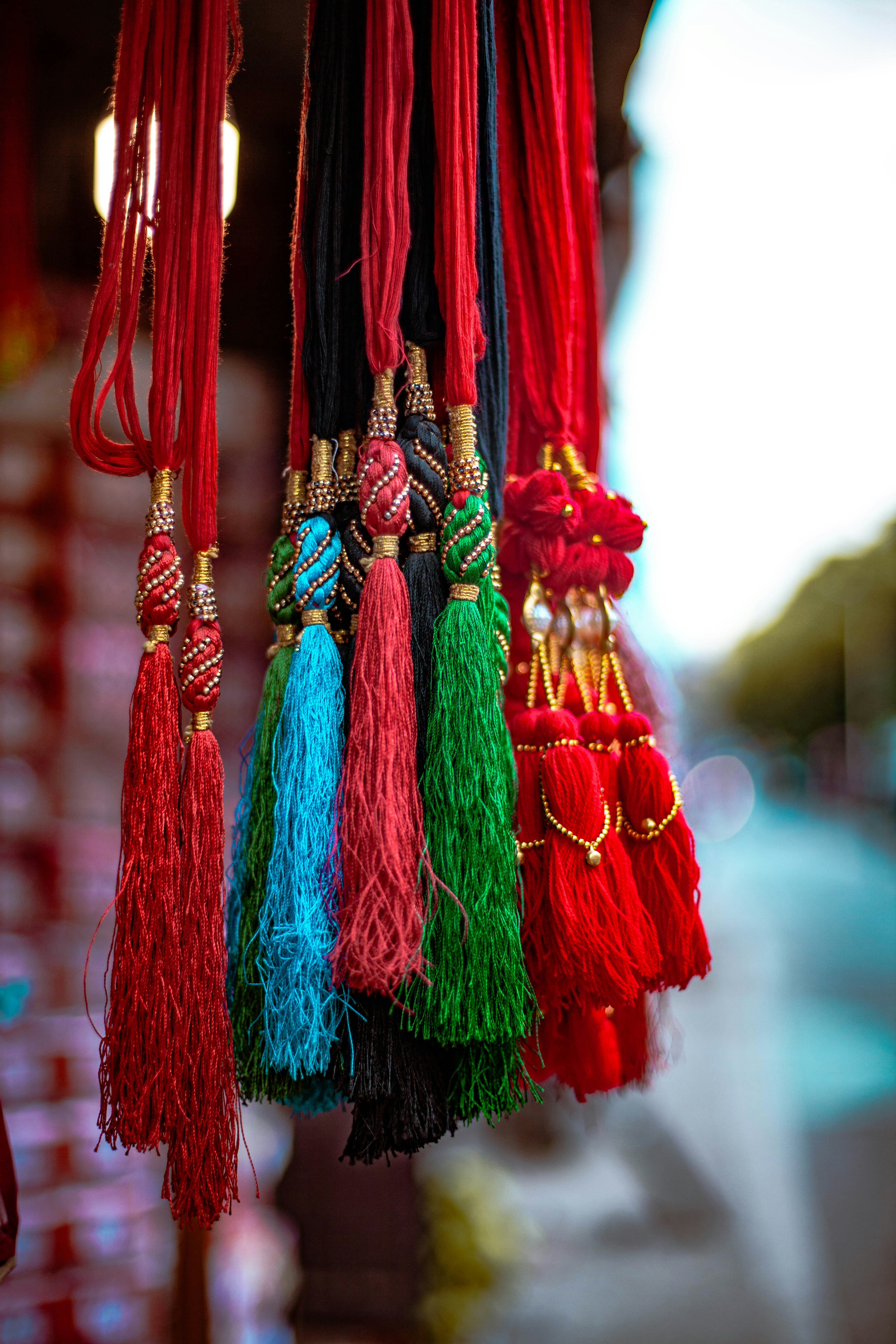 A bunch of tassels hanging from a ceiling photo – Free Nepal Image on ...