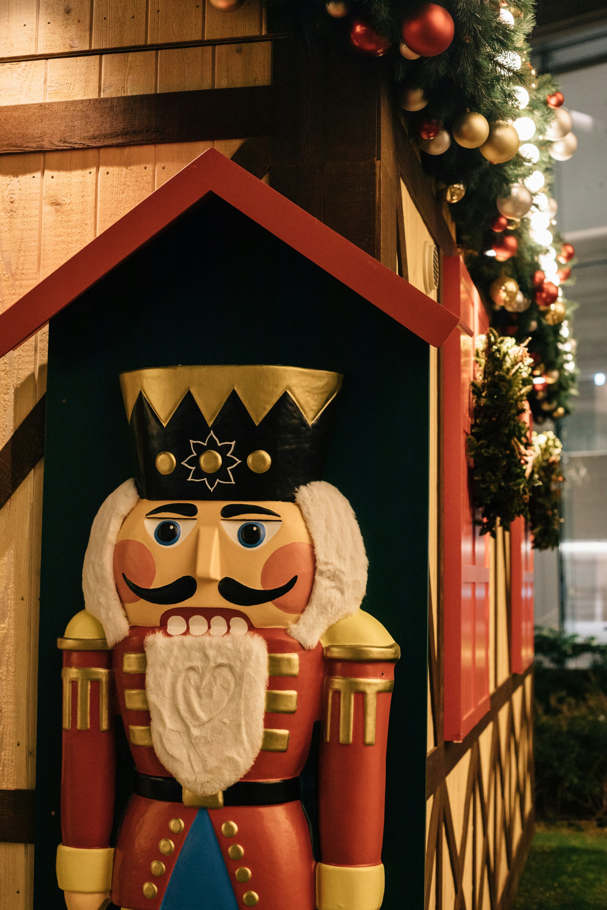 A large nutcracker statue sitting in a doorway photo – Free Nutcracker ...