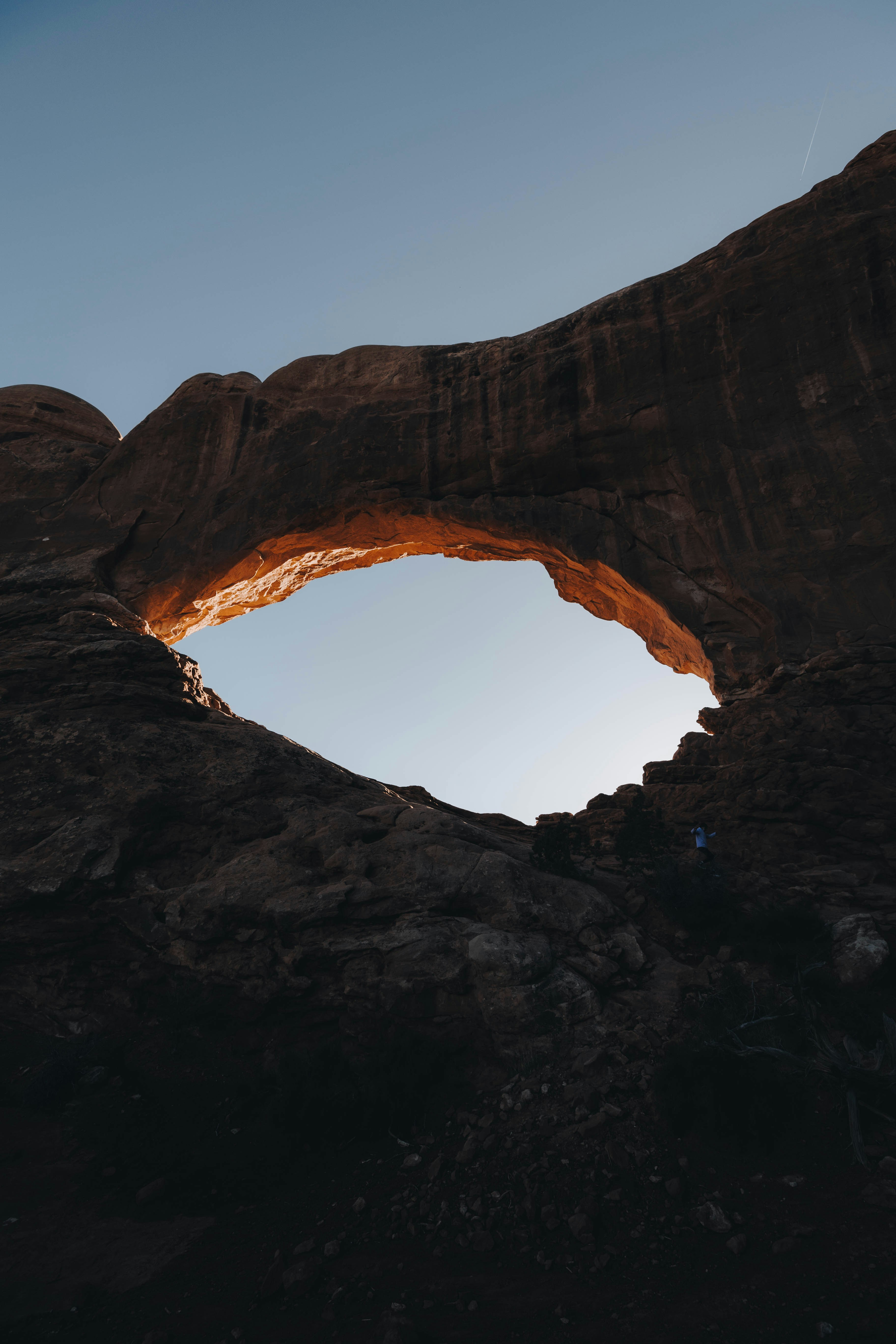 A large rock formation with a hole in the middle photo – Free Nature ...