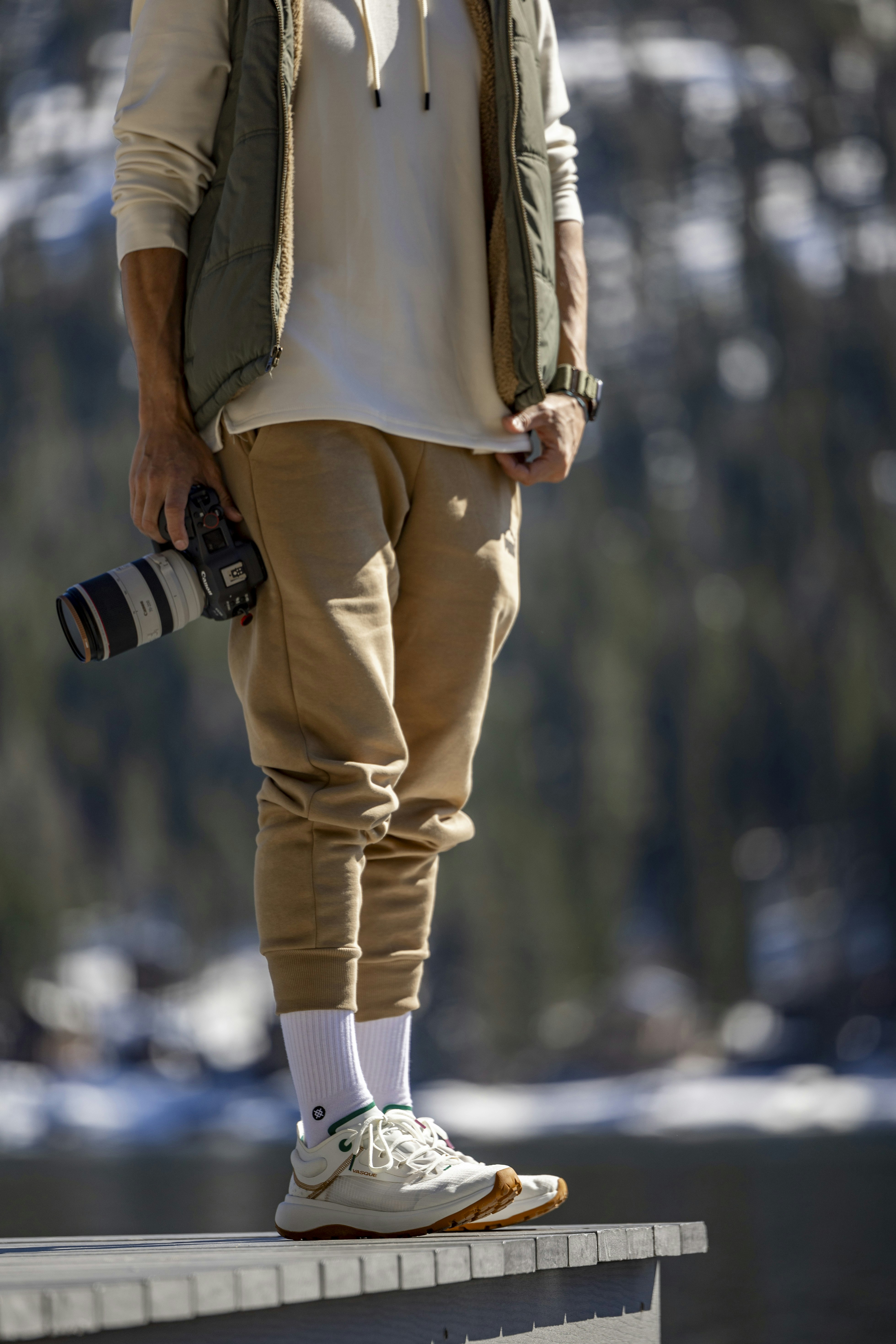 Dockside Gaze: A Lens-Wielding Figure Pauses at the Edge