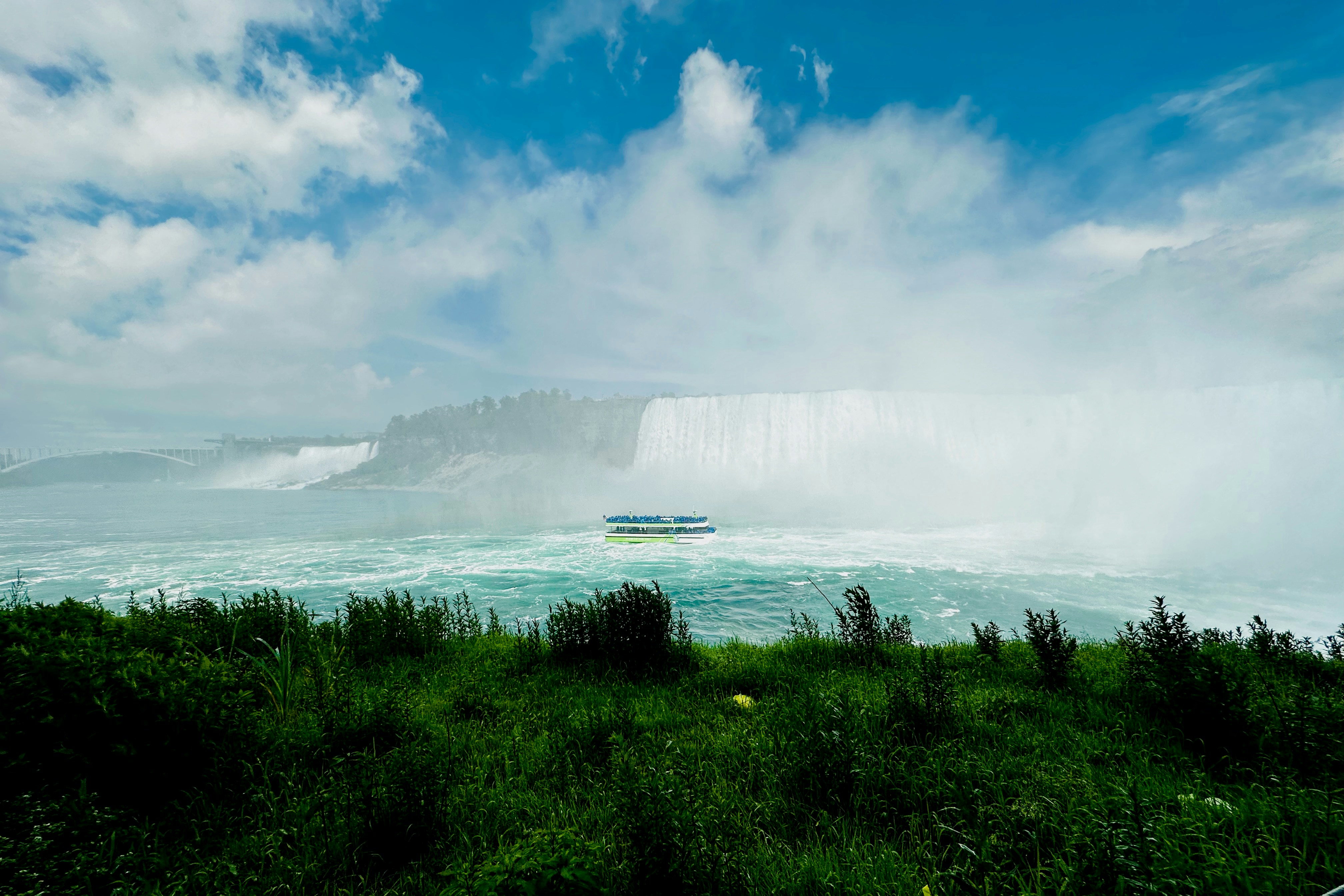 Mist-veiled Thunder: A Buoyant Boat Hold Amid Niagara’s Curtain