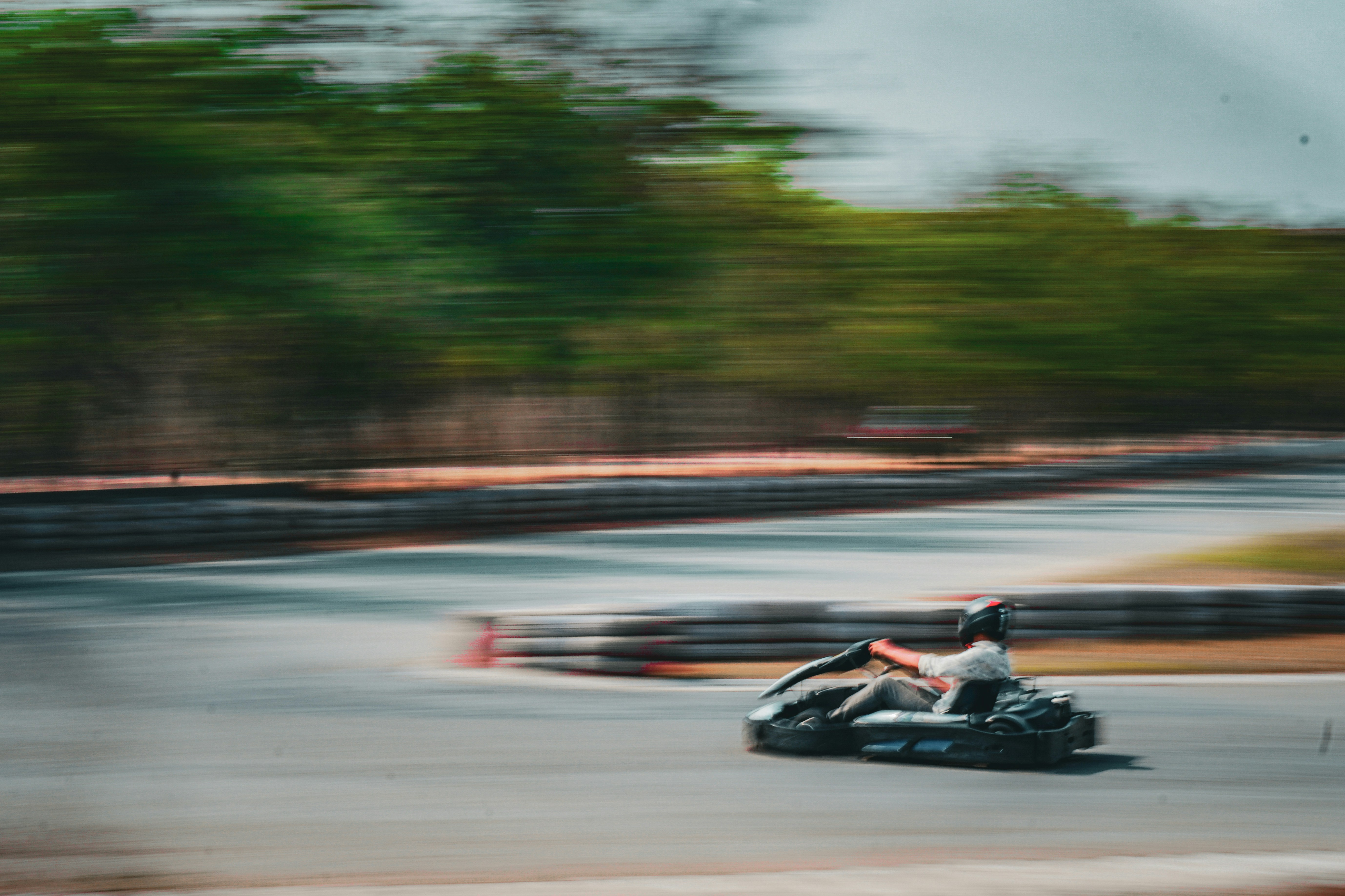 A person riding a motorcycle on a race track photo – Free Chicane ...