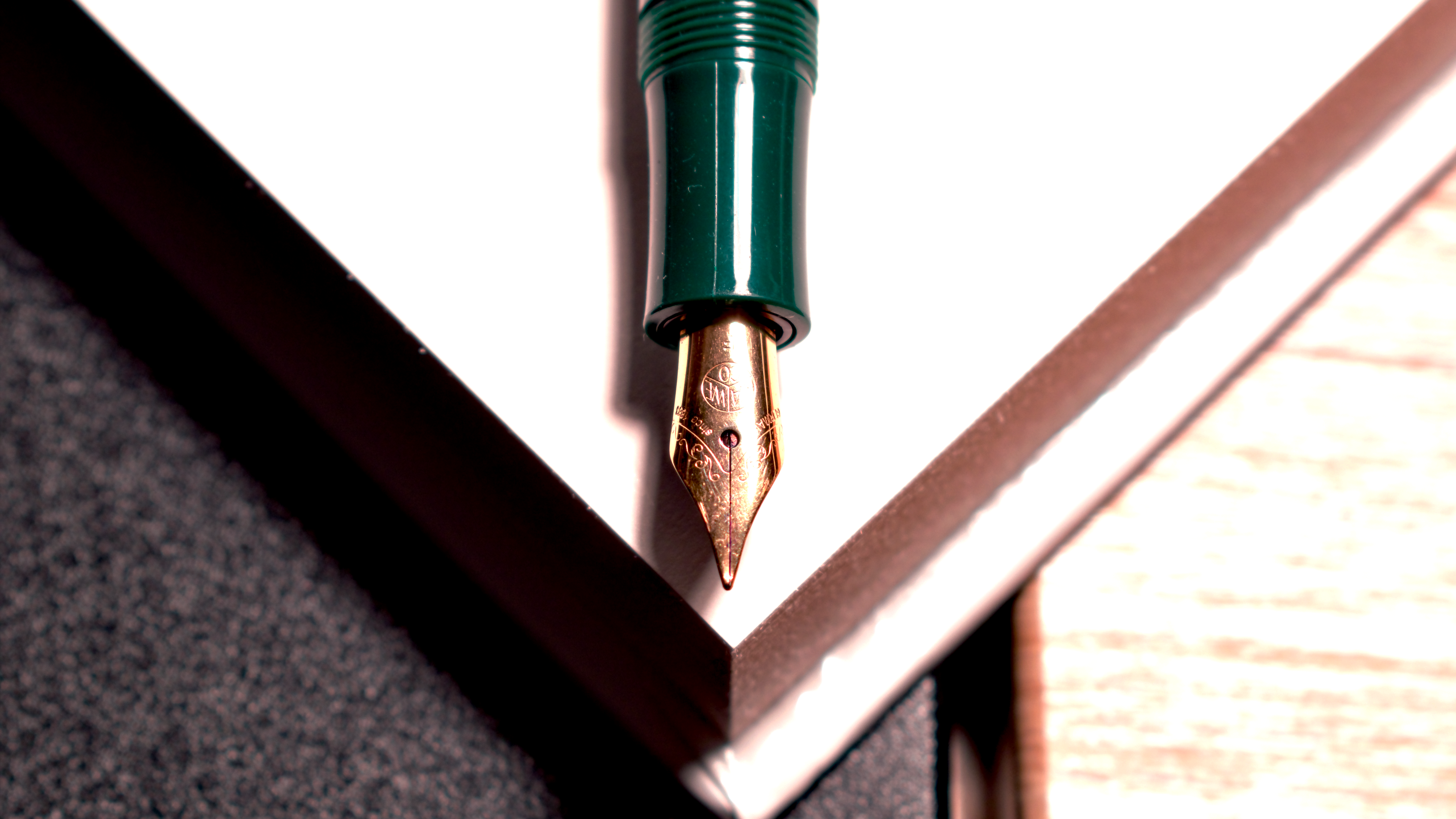 A close up of a pen on a table photo – Free Pen Image on Unsplash