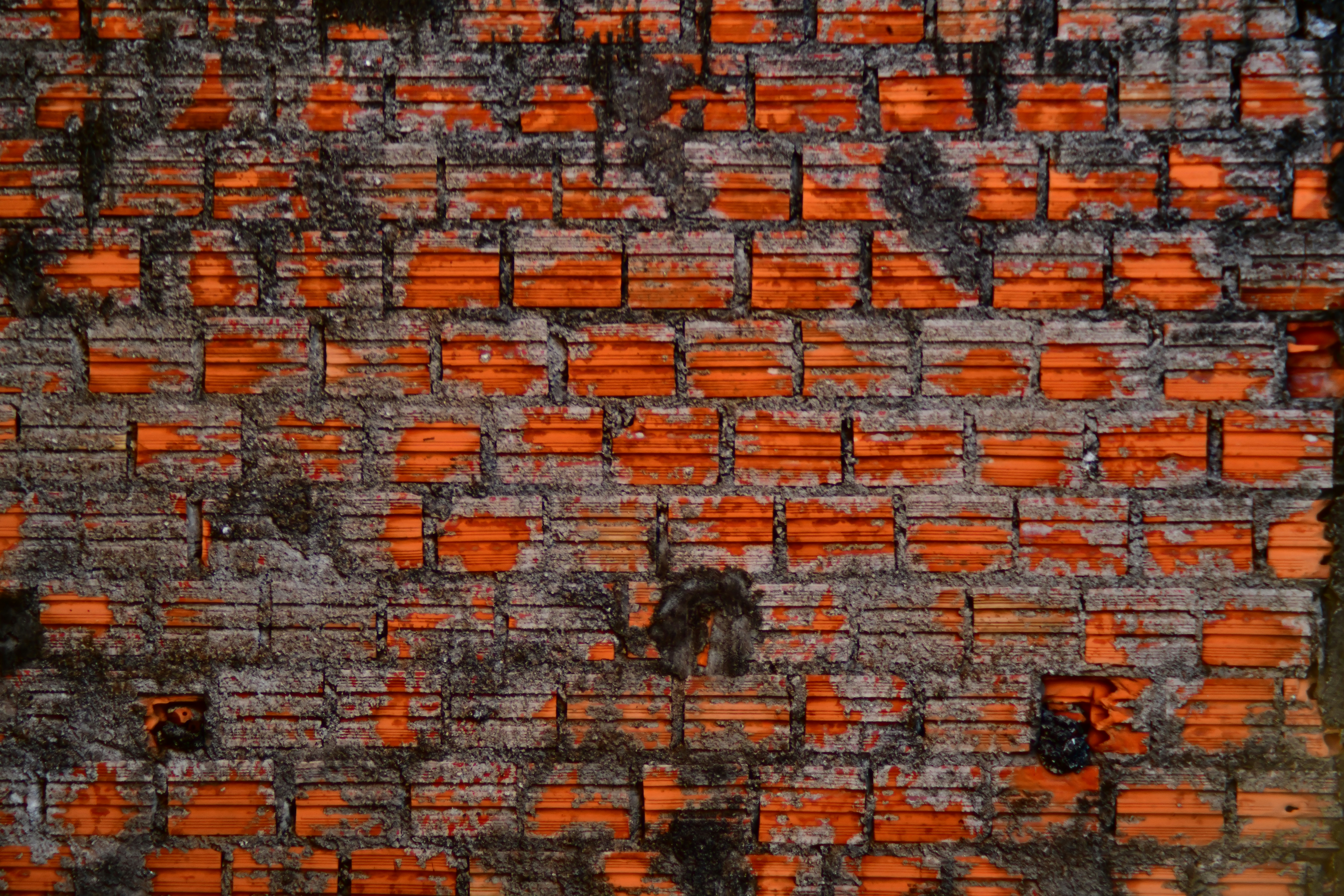 Amber Grid: Weathered Bricks Revealing Time through Texture