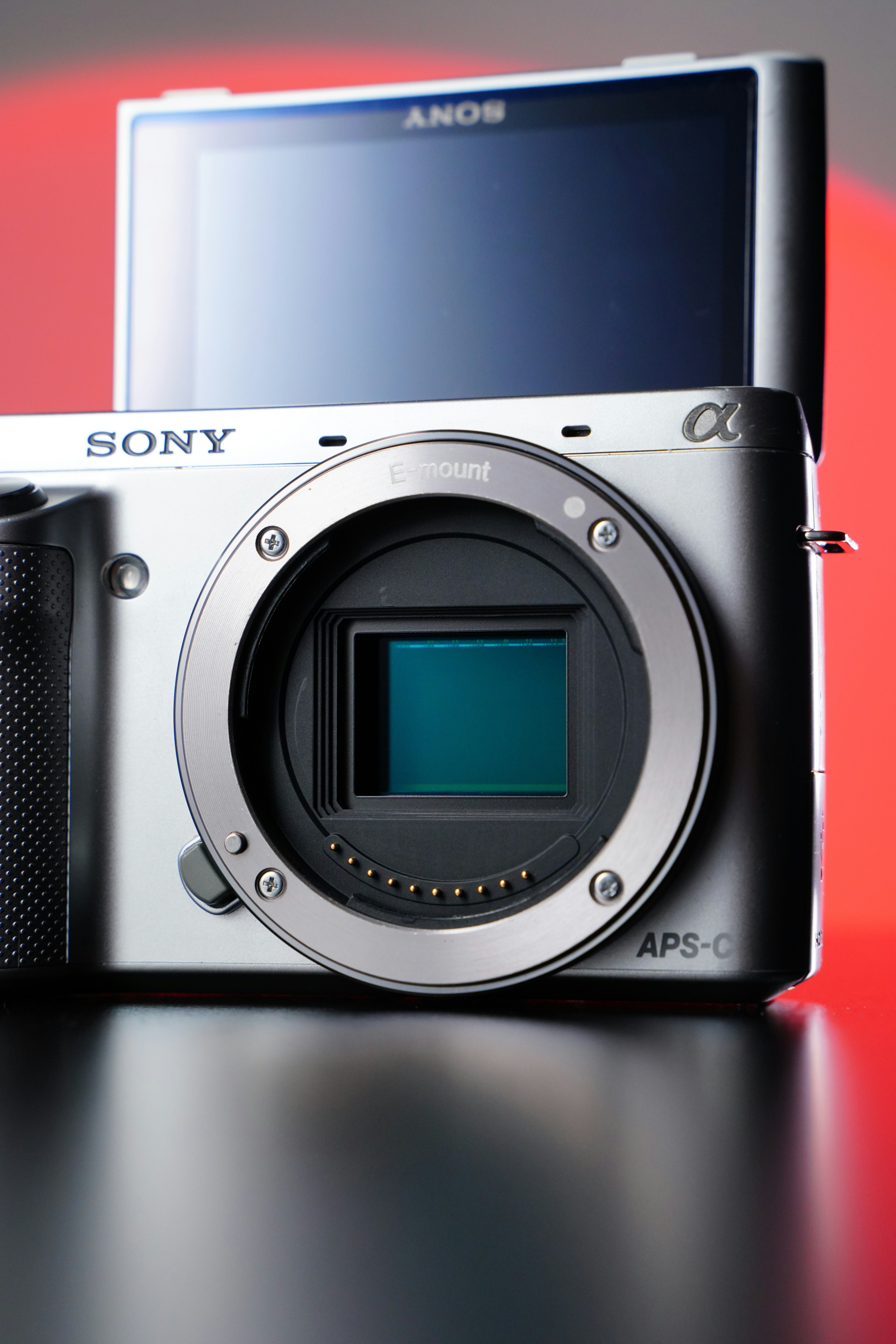 A sony camera sitting on top of a table photo – Free Creative equipment ...