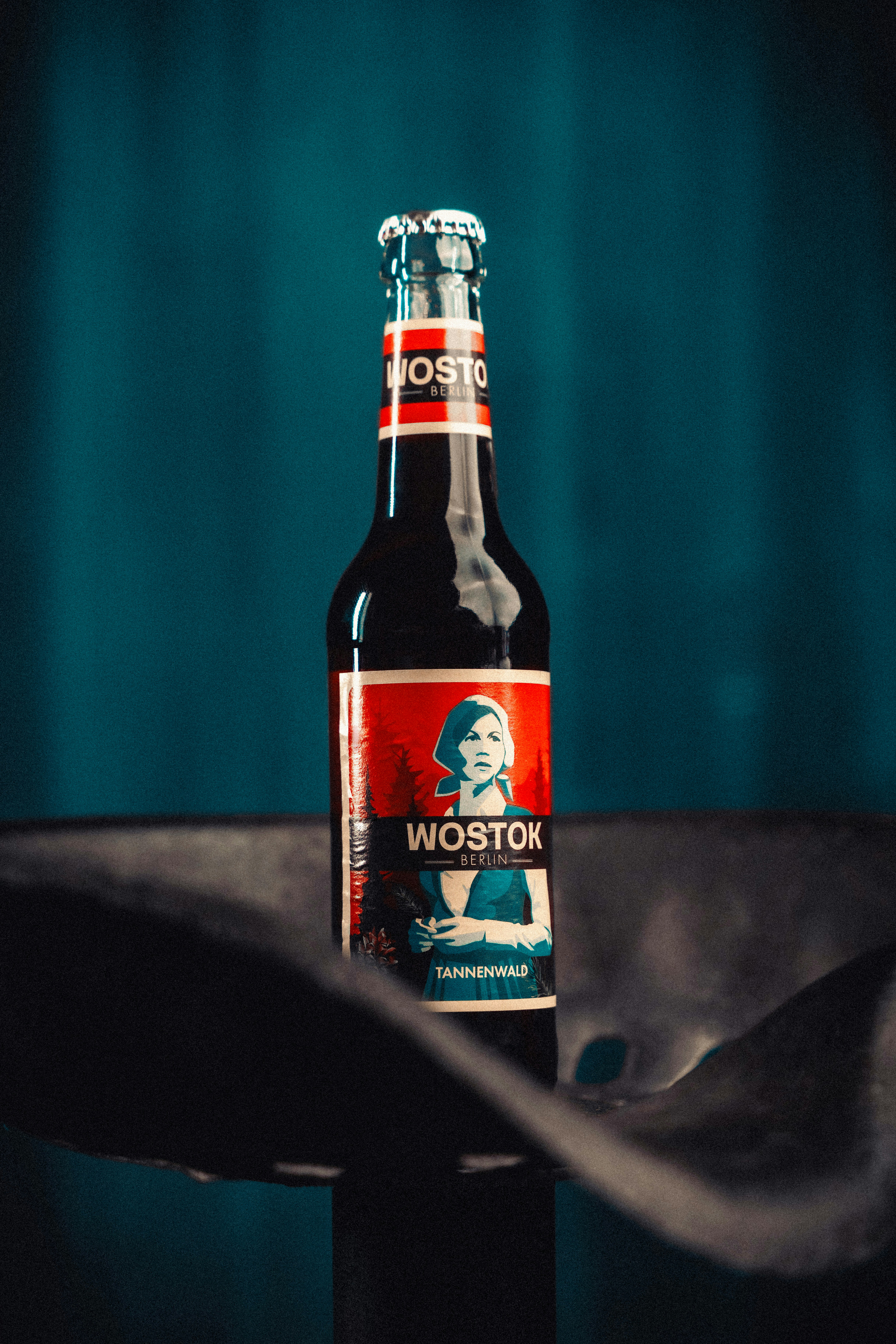 Teal Spotlight Portrait: Wostok Berlin Bottle Centerstage