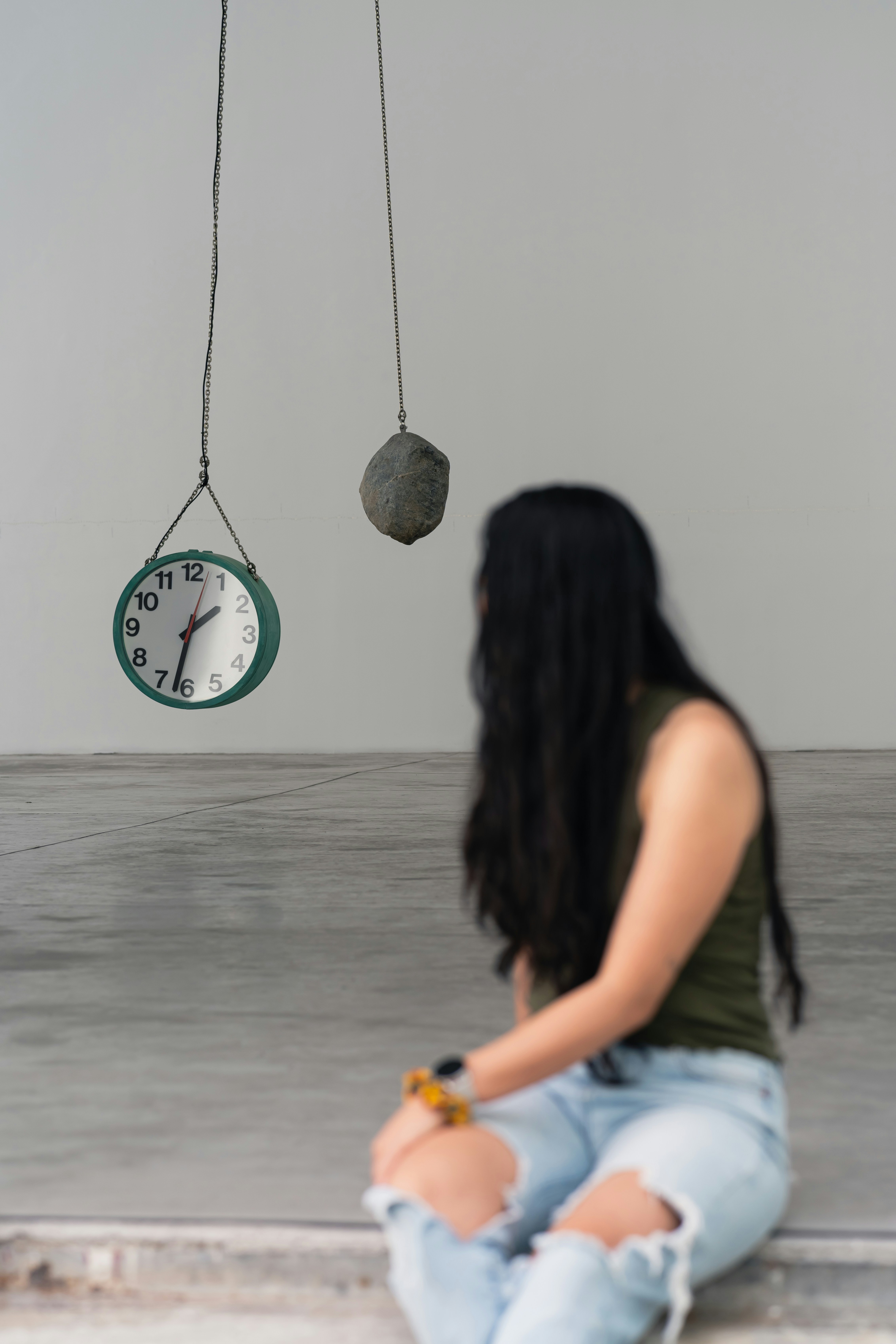Time Suspended: A Clock, a Rock, and a Quiet Presence