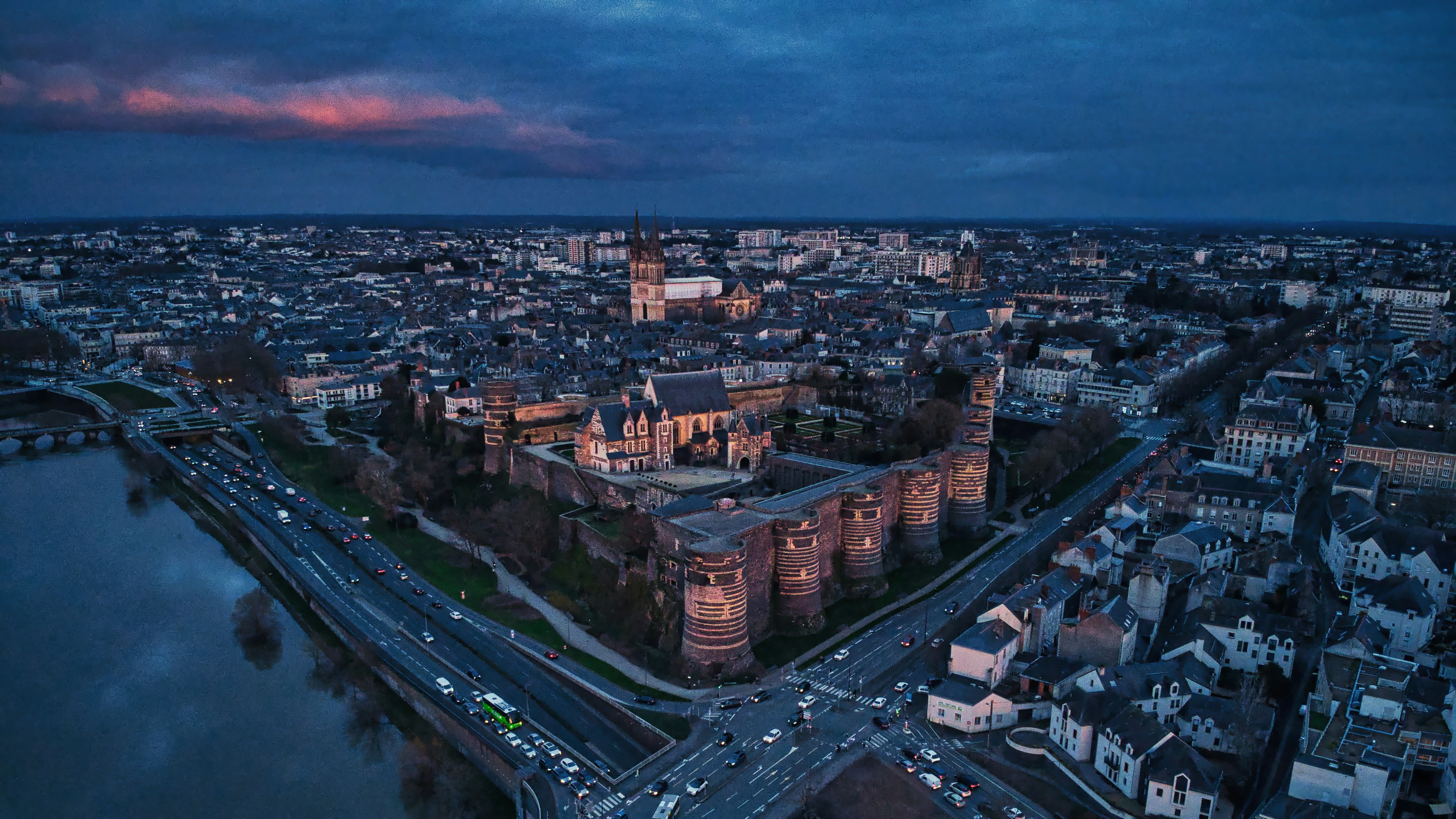 An aerial view of a city at night photo – Free Angers Image on Unsplash