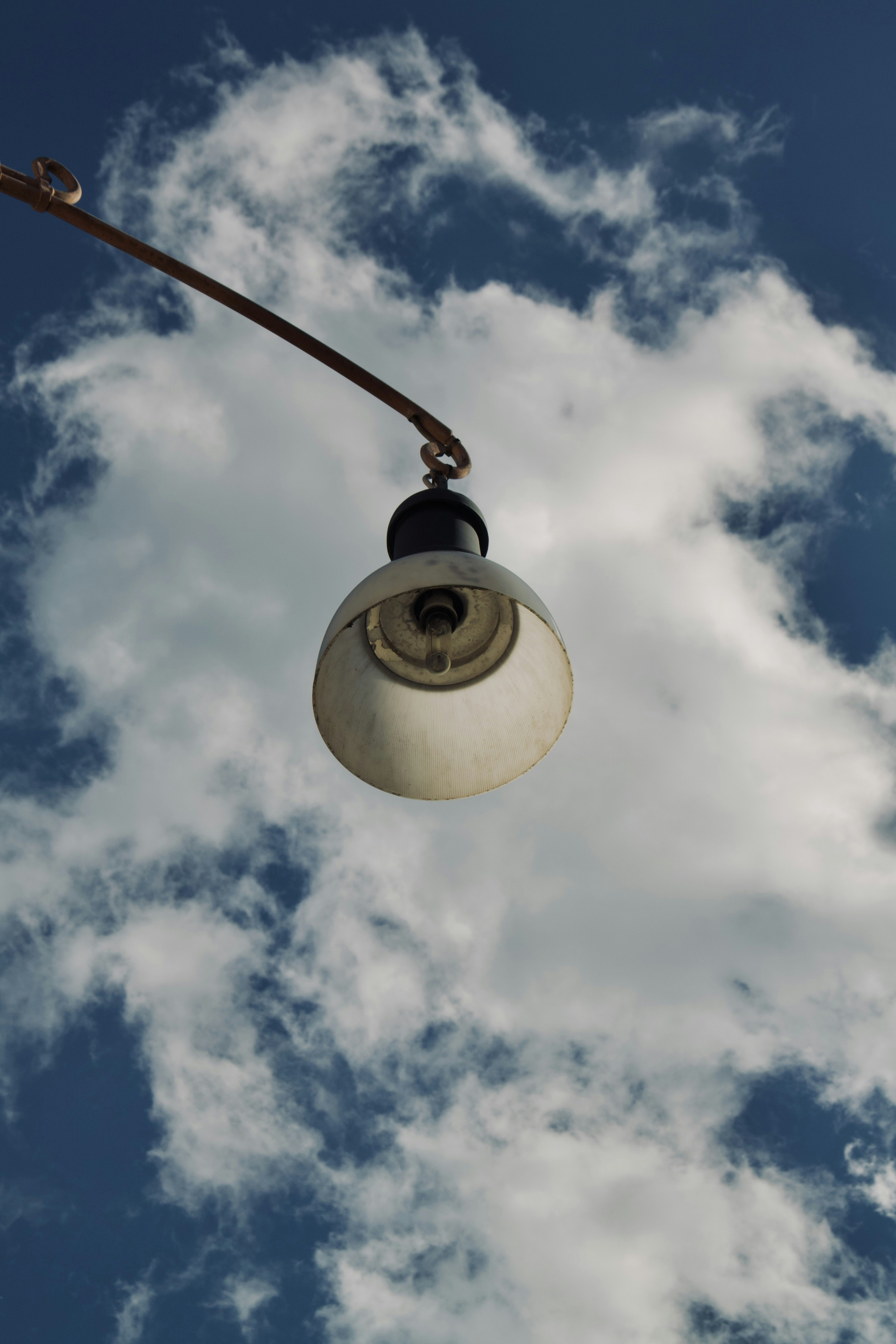 Blink of Metal Against Sky: The Lamp in Flight