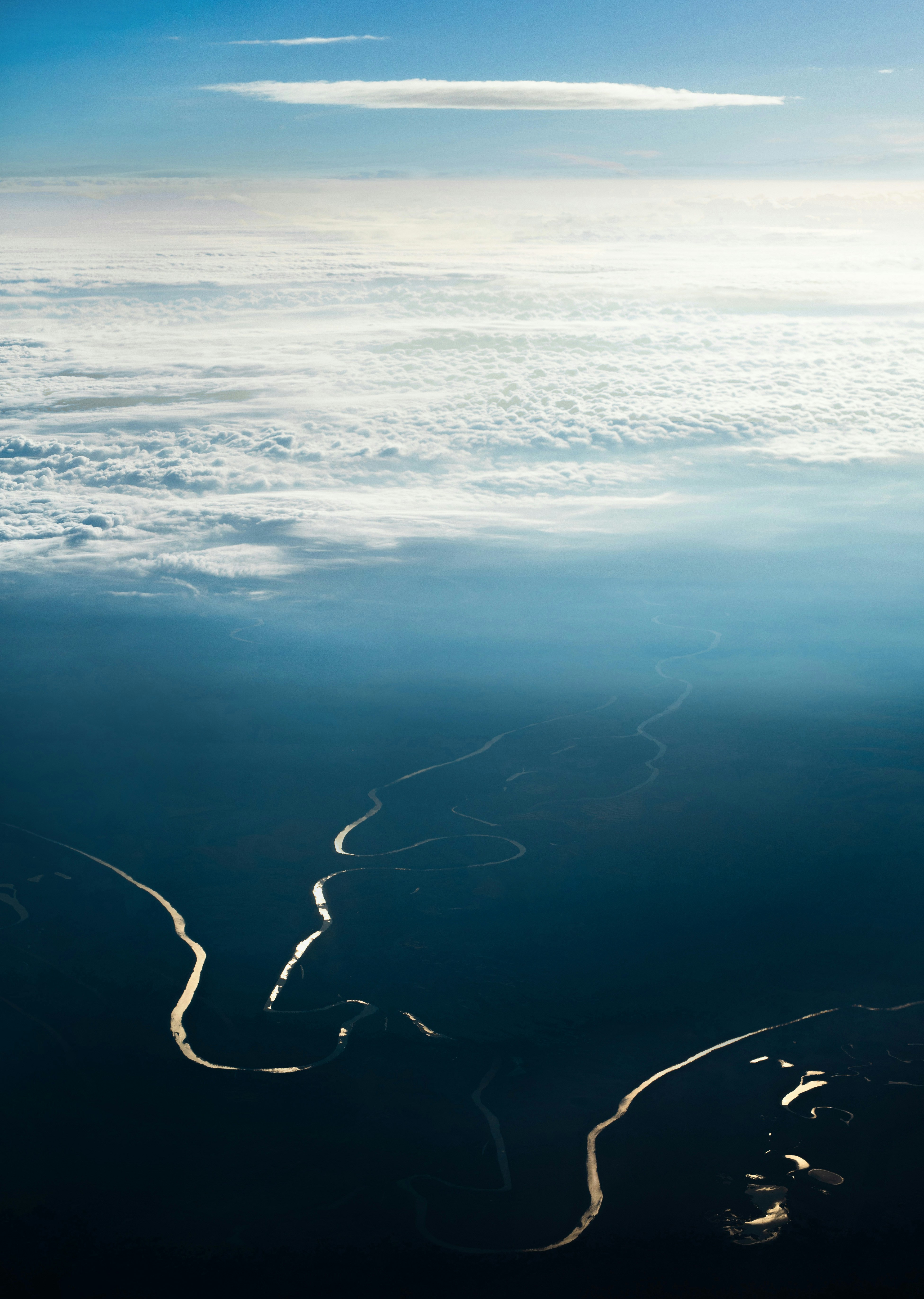 An aerial view of a river in the sky photo – Free Nature Image on Unsplash
