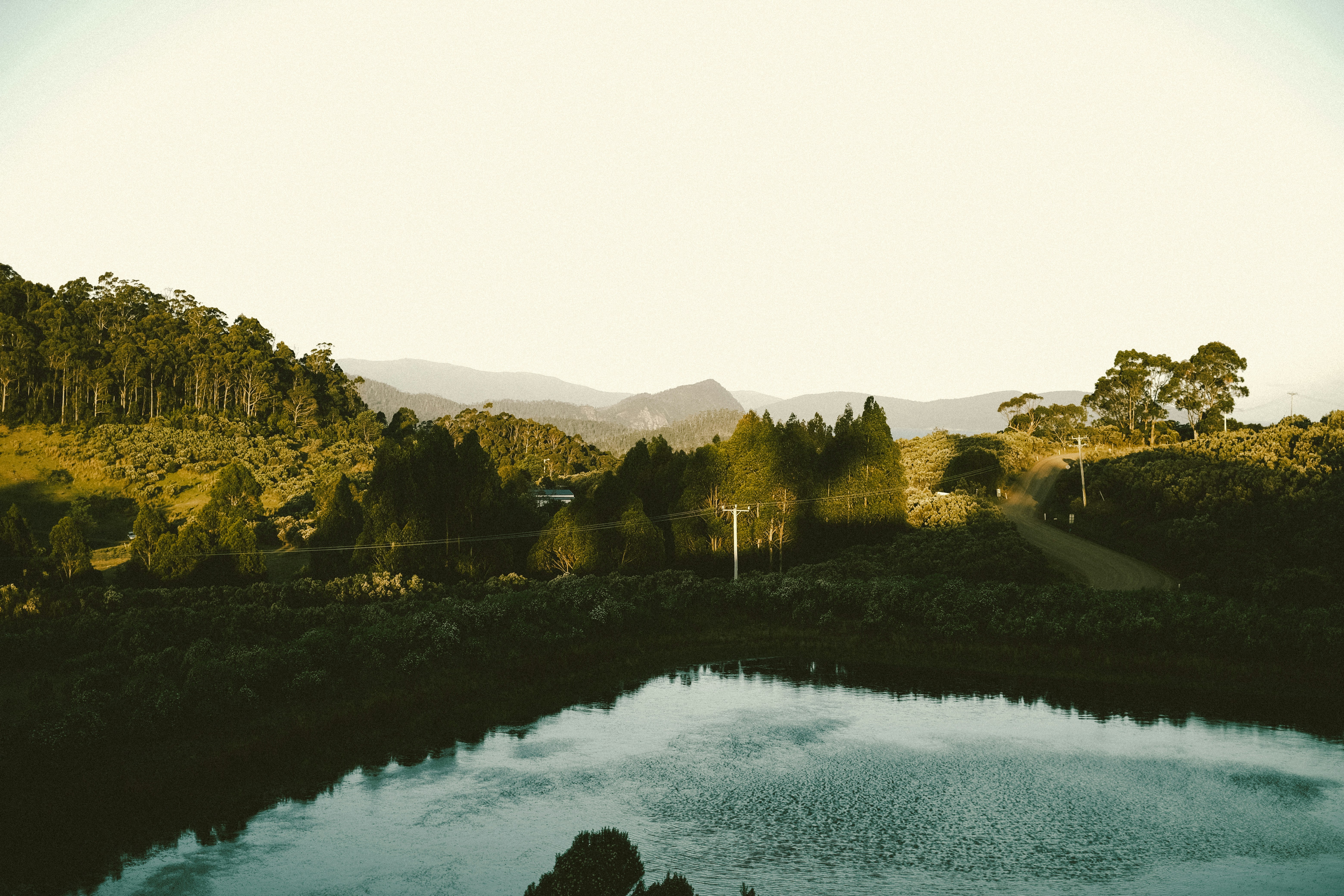 Golden Hour Over a Quiet Reservoir Ridge