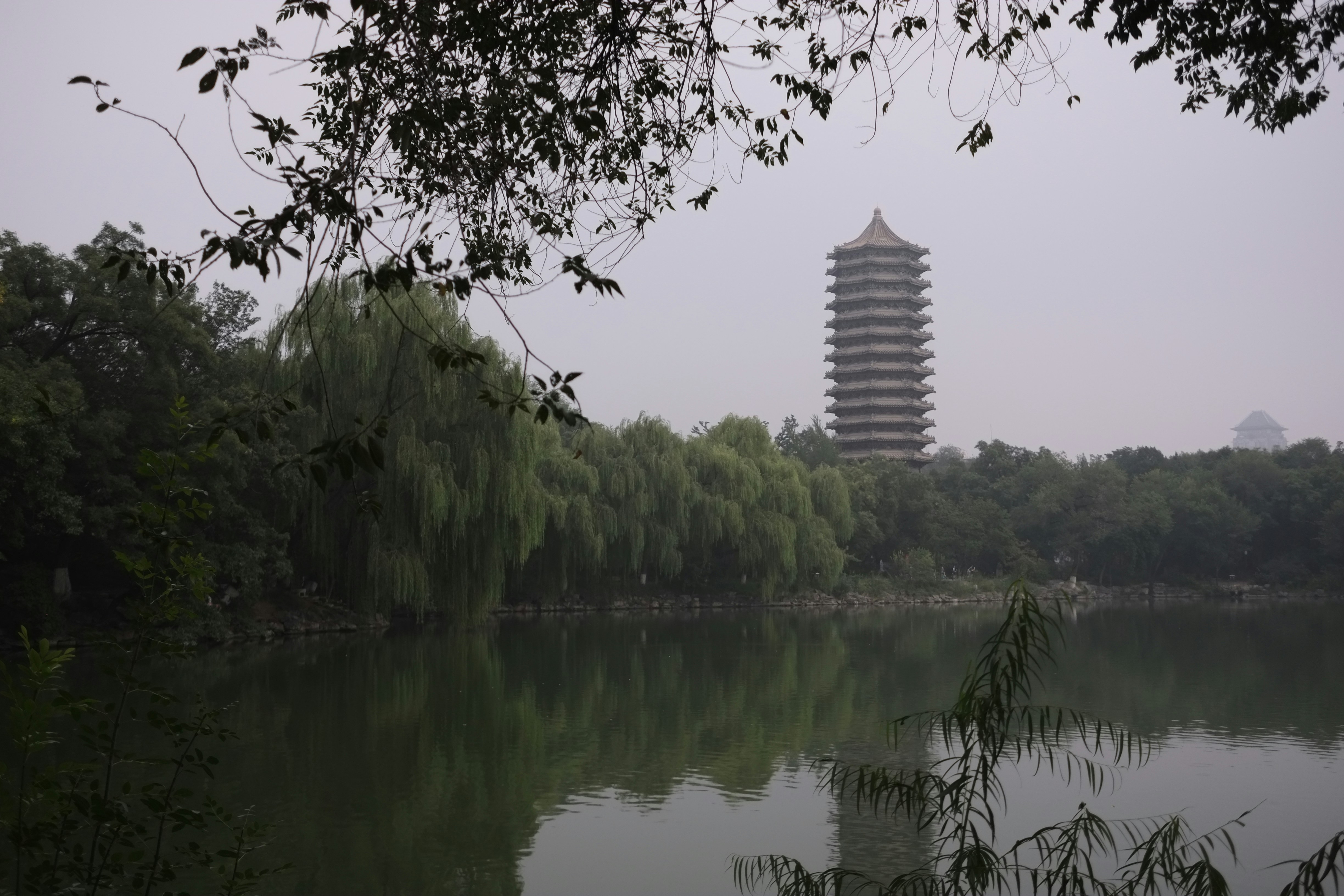 A tall tower towering over a body of water photo – Free Image on Unsplash