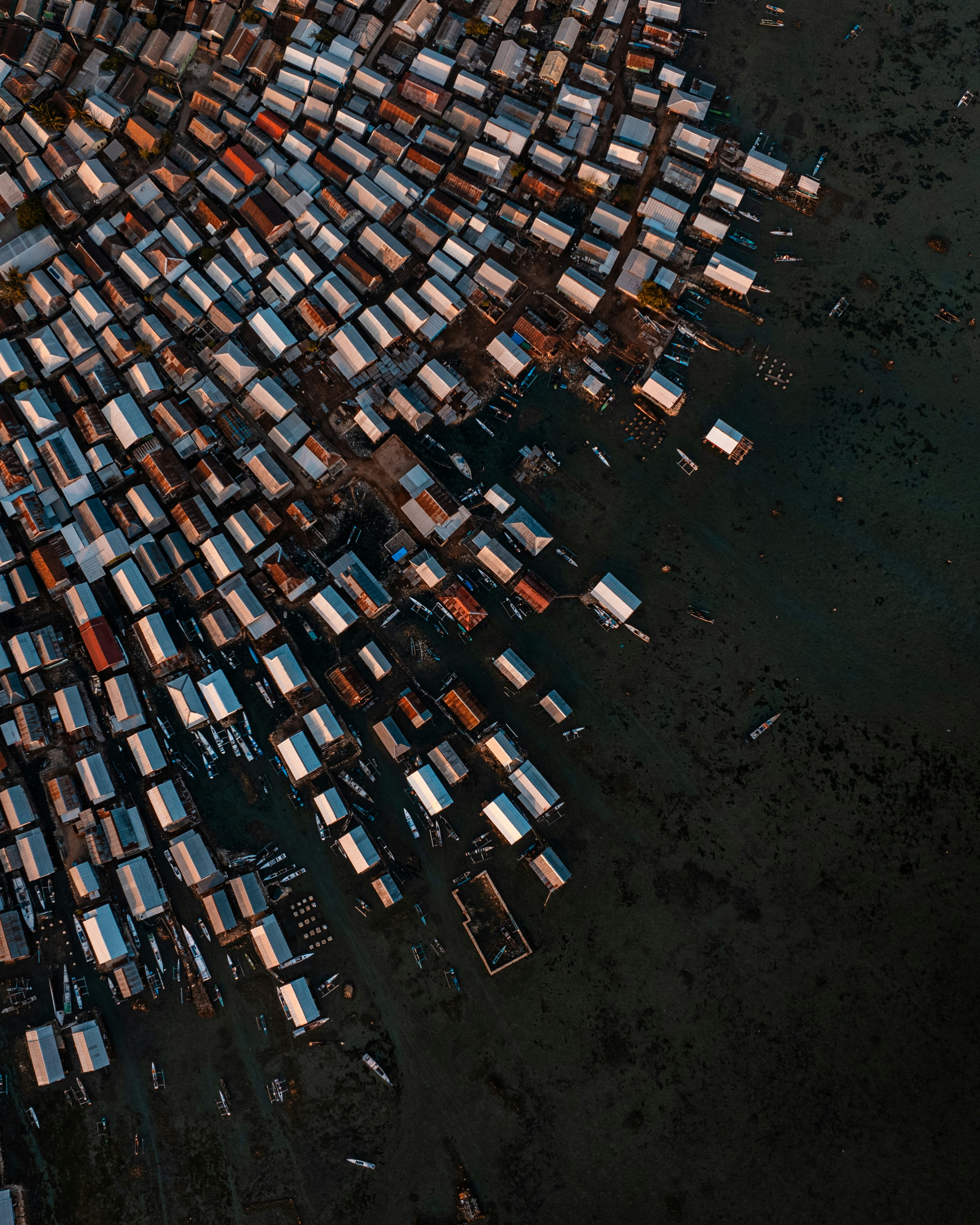 Dusk Grid: Floating Homes Form a Tidal Mosaic