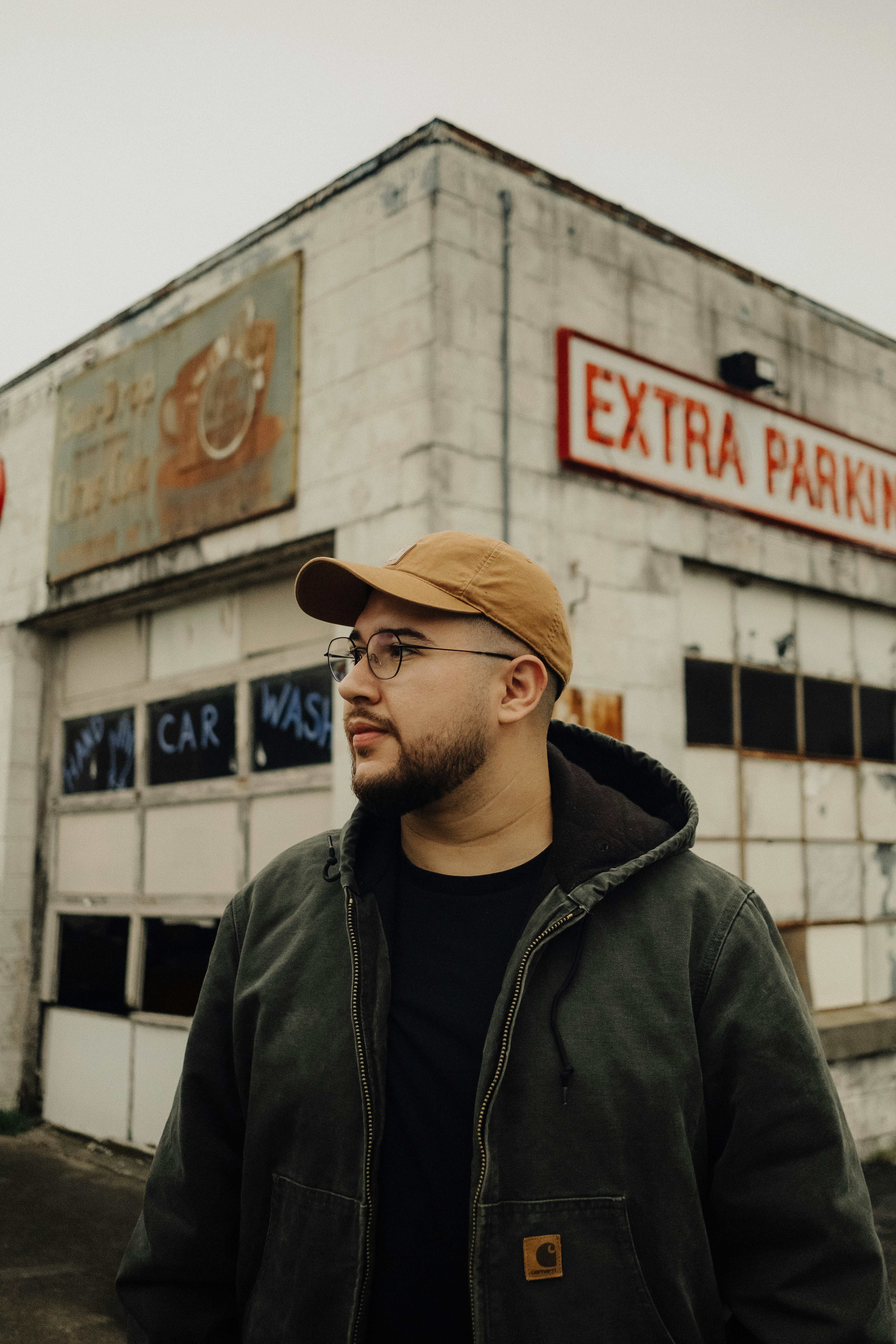 a man standing in front of a building