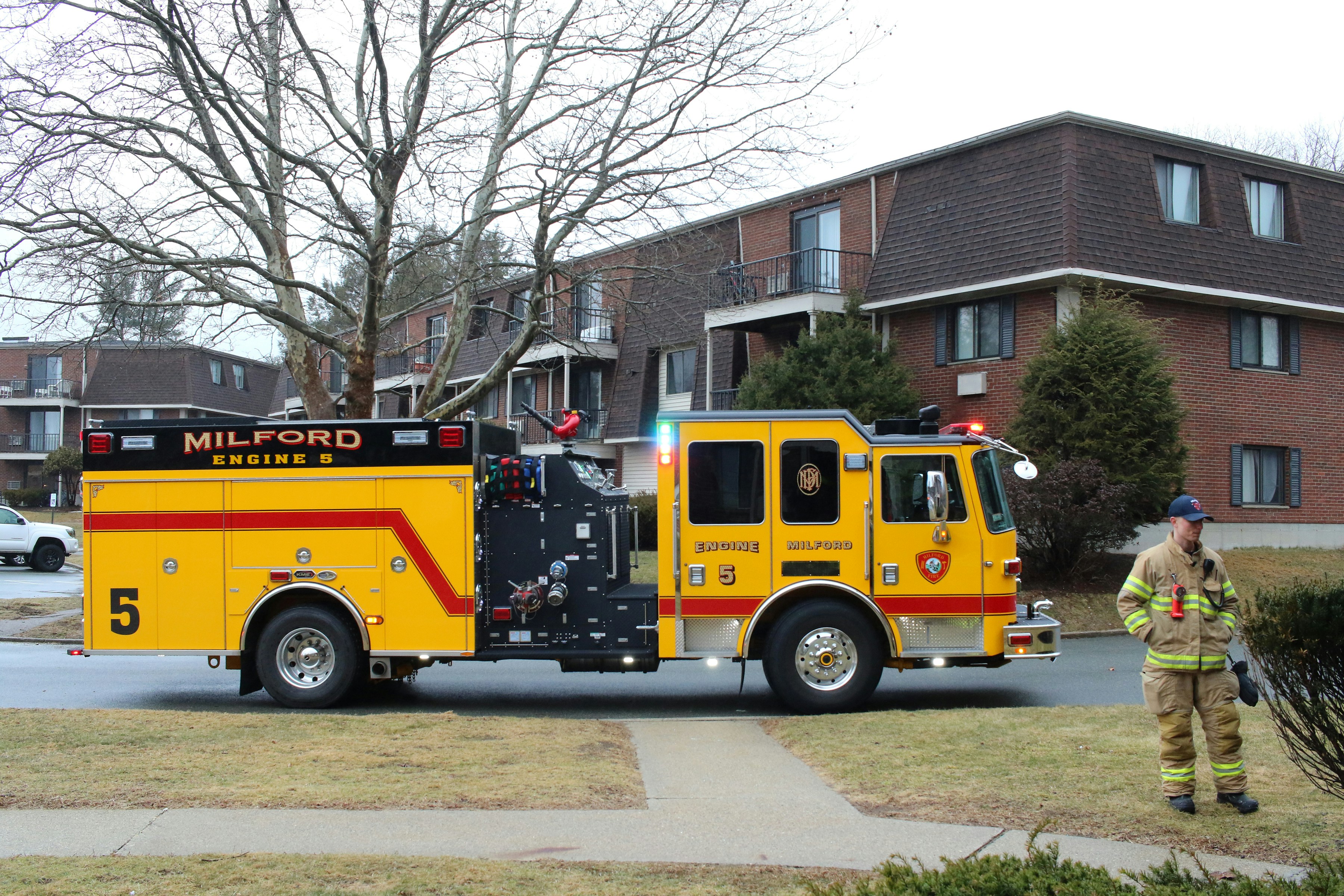 A fire truck parked on the side of a road photo – Free Firetruck Image ...