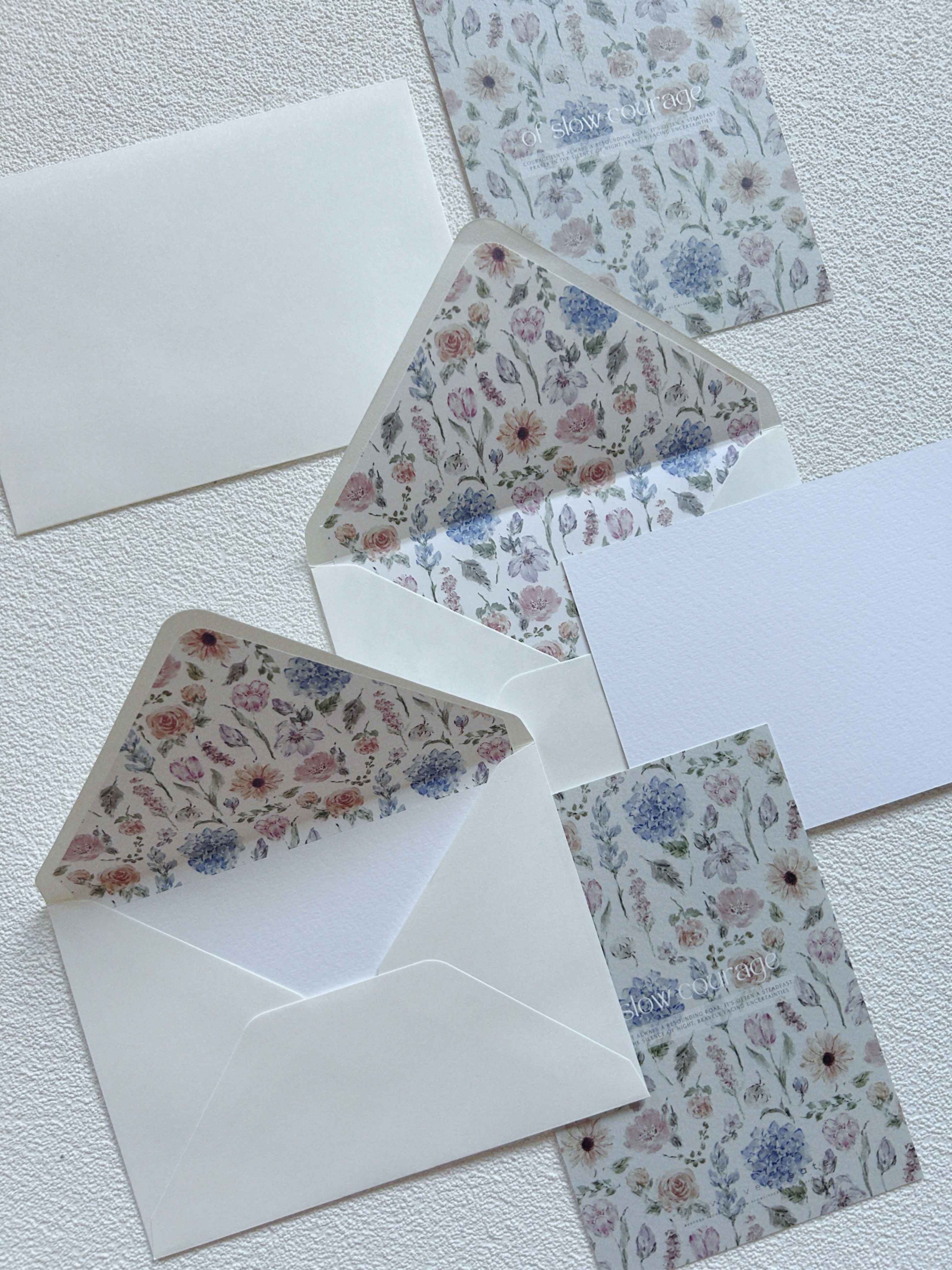 A group of envelopes sitting on top of a table photo – Free Paper Image ...