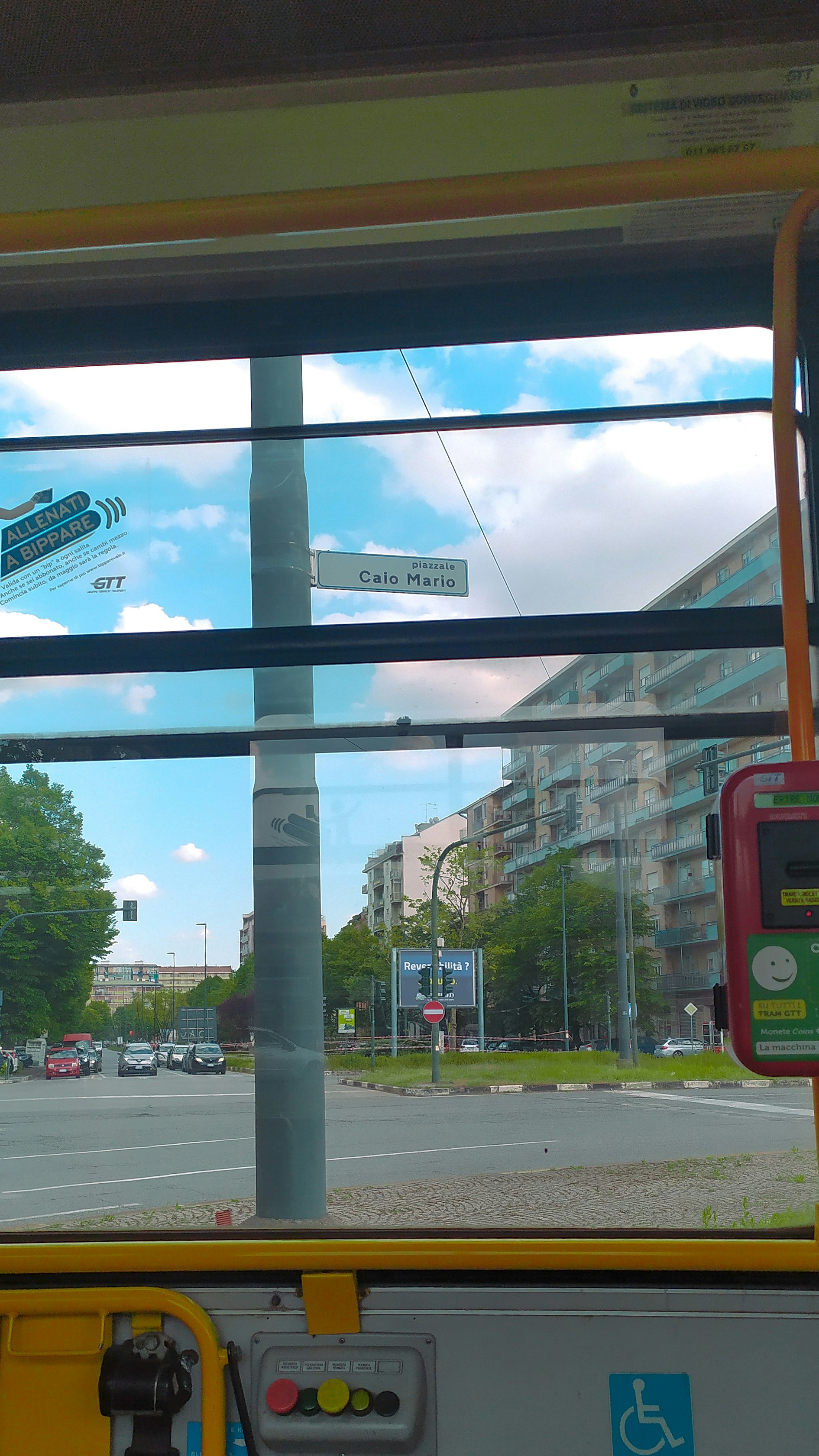 Caio Mario Street Sign Framed by Urban Transit Grilles