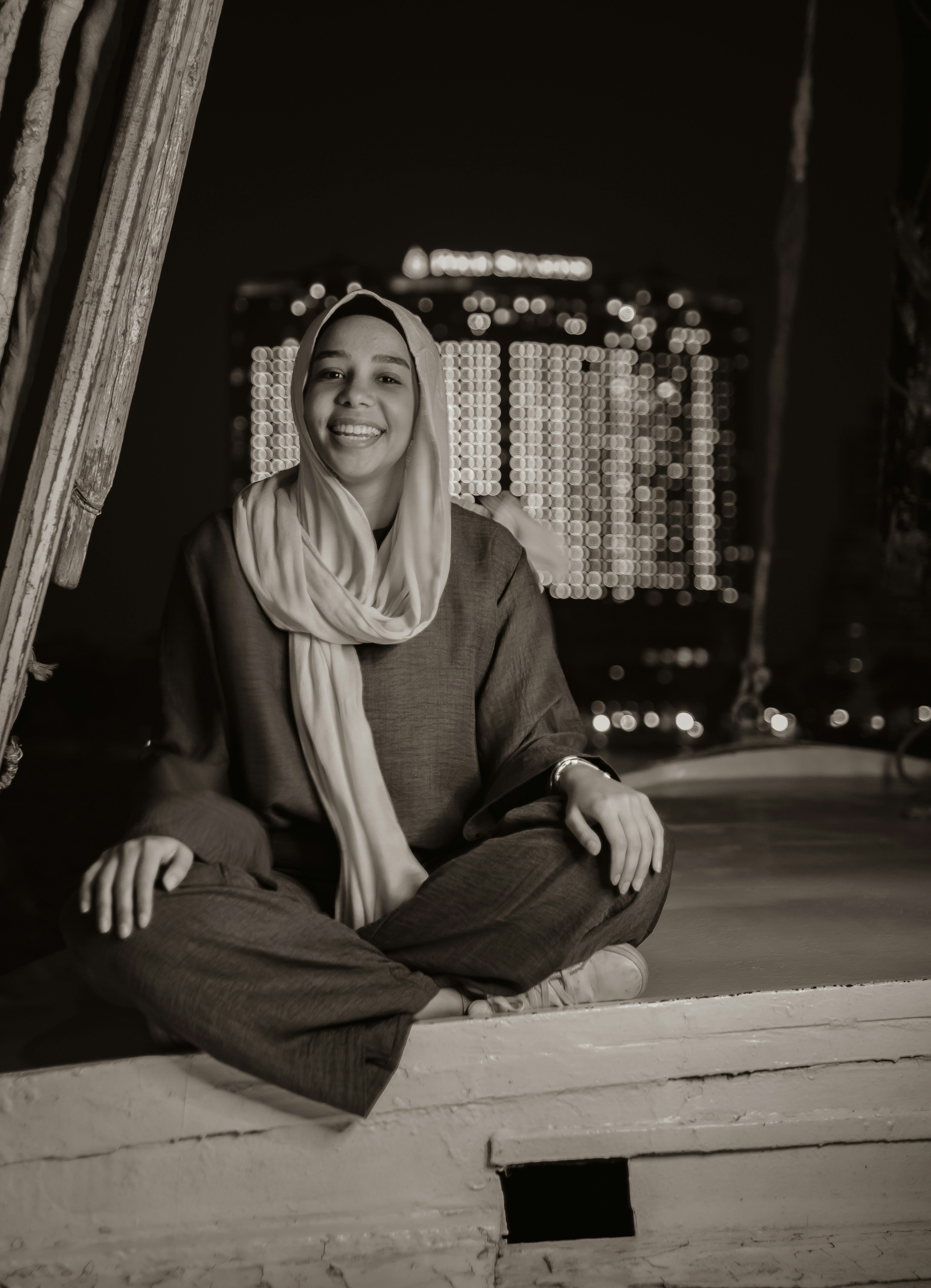 Rooftop Laughter Beneath Sepia City Lights