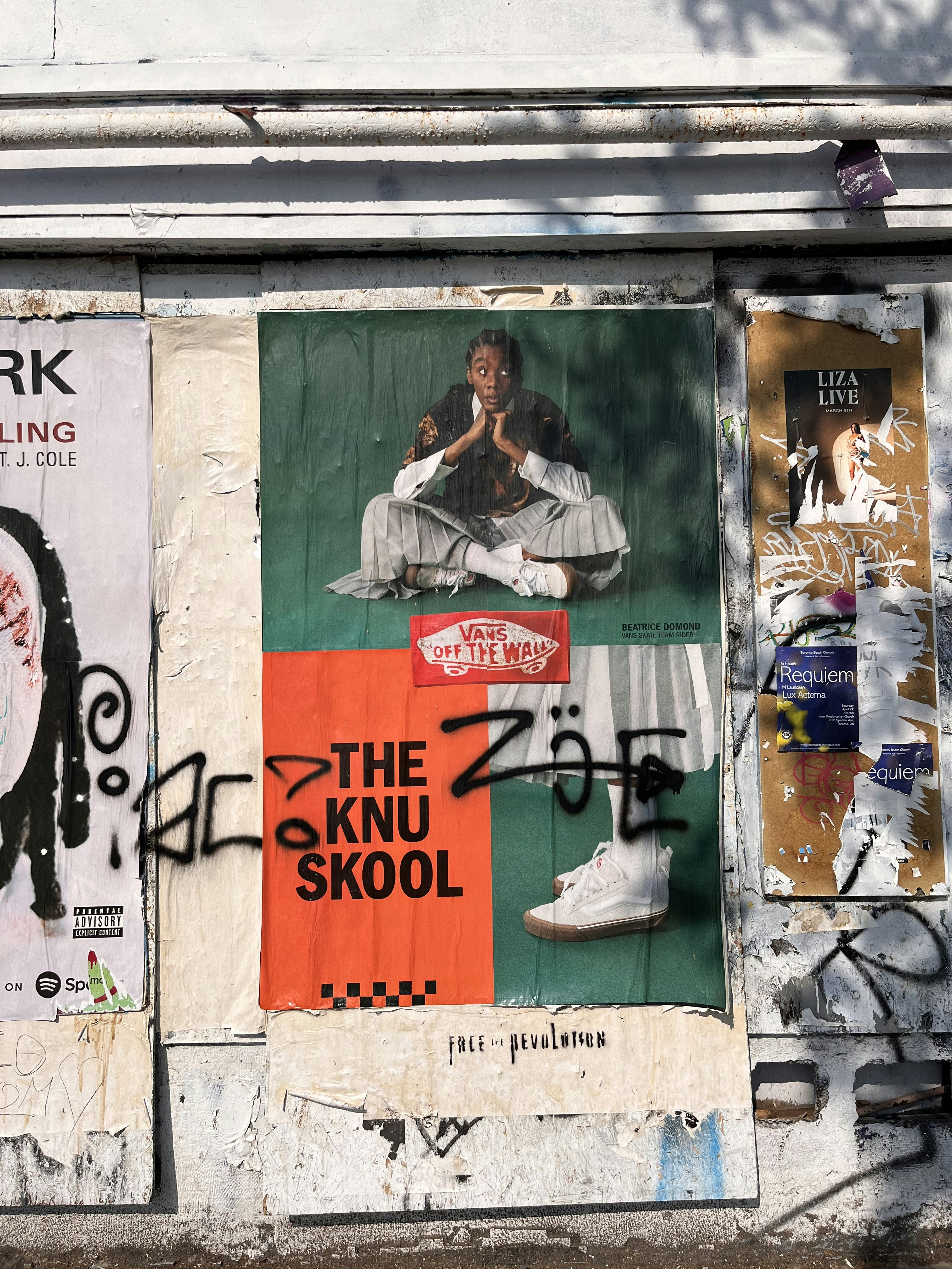 A bunch of posters on the side of a building photo – Free 캐나다 m5t 온타리오 ...