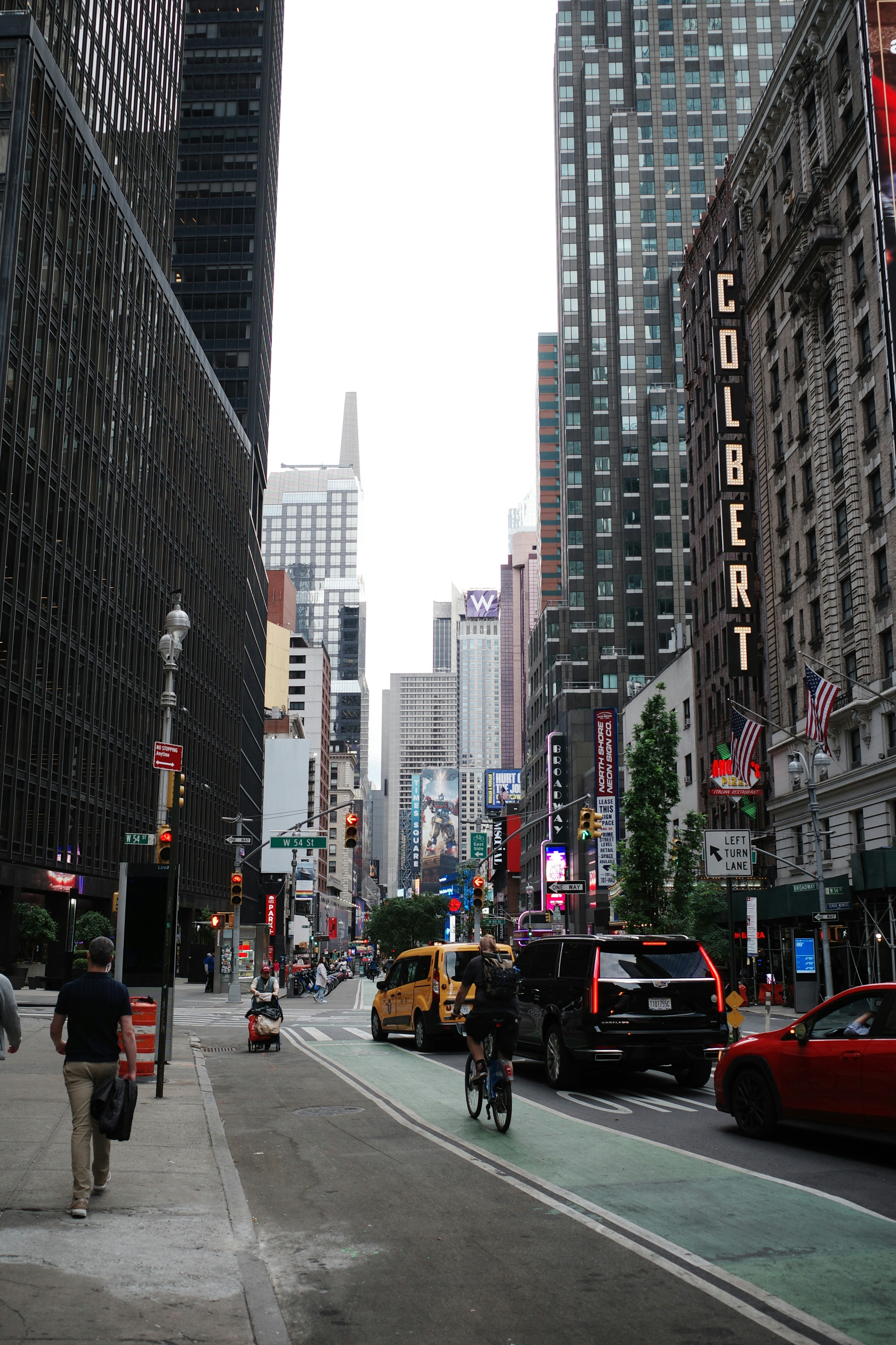 City Pulse: Pedestrian and Traffic Flow Beneath Tall Facades