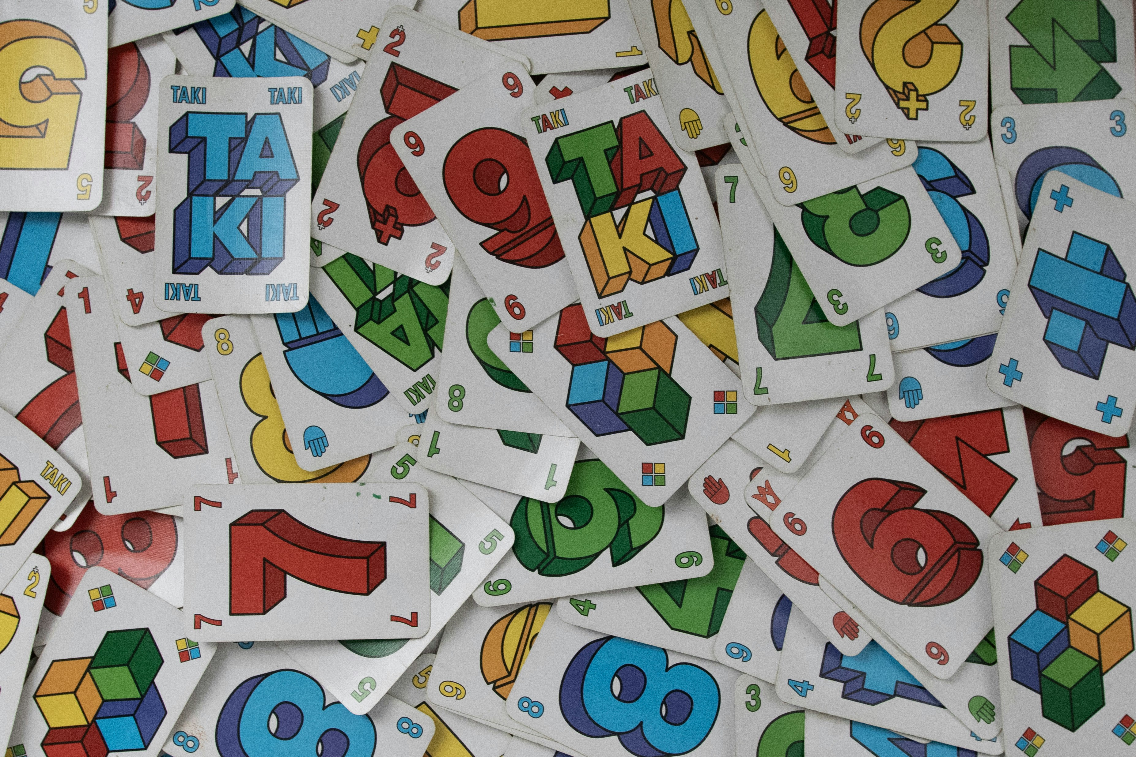 A pile of stickers with numbers and letters on them photo – Free טאקי ...