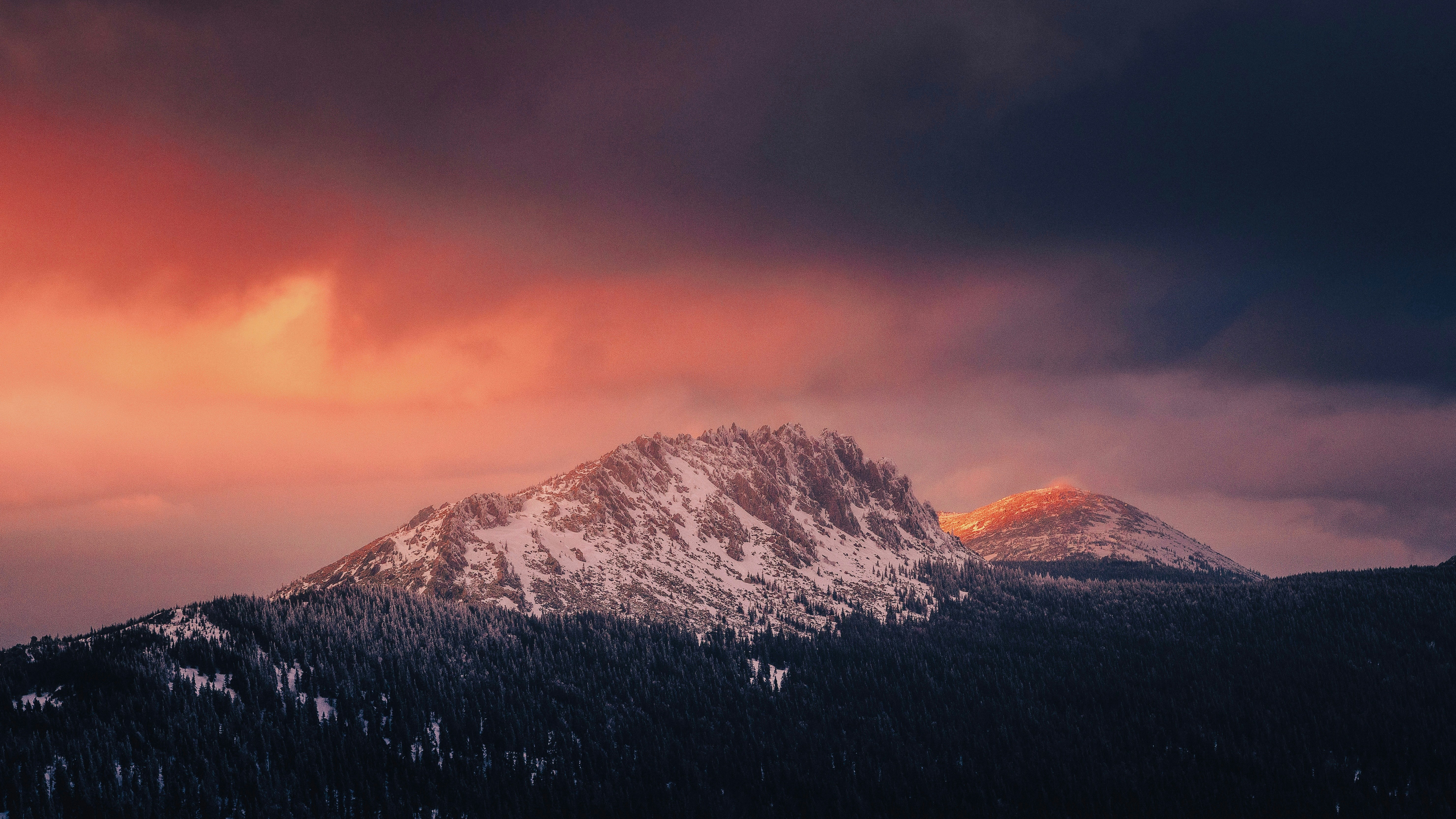 Crimson Crown over Snowbound Summit at Dusk