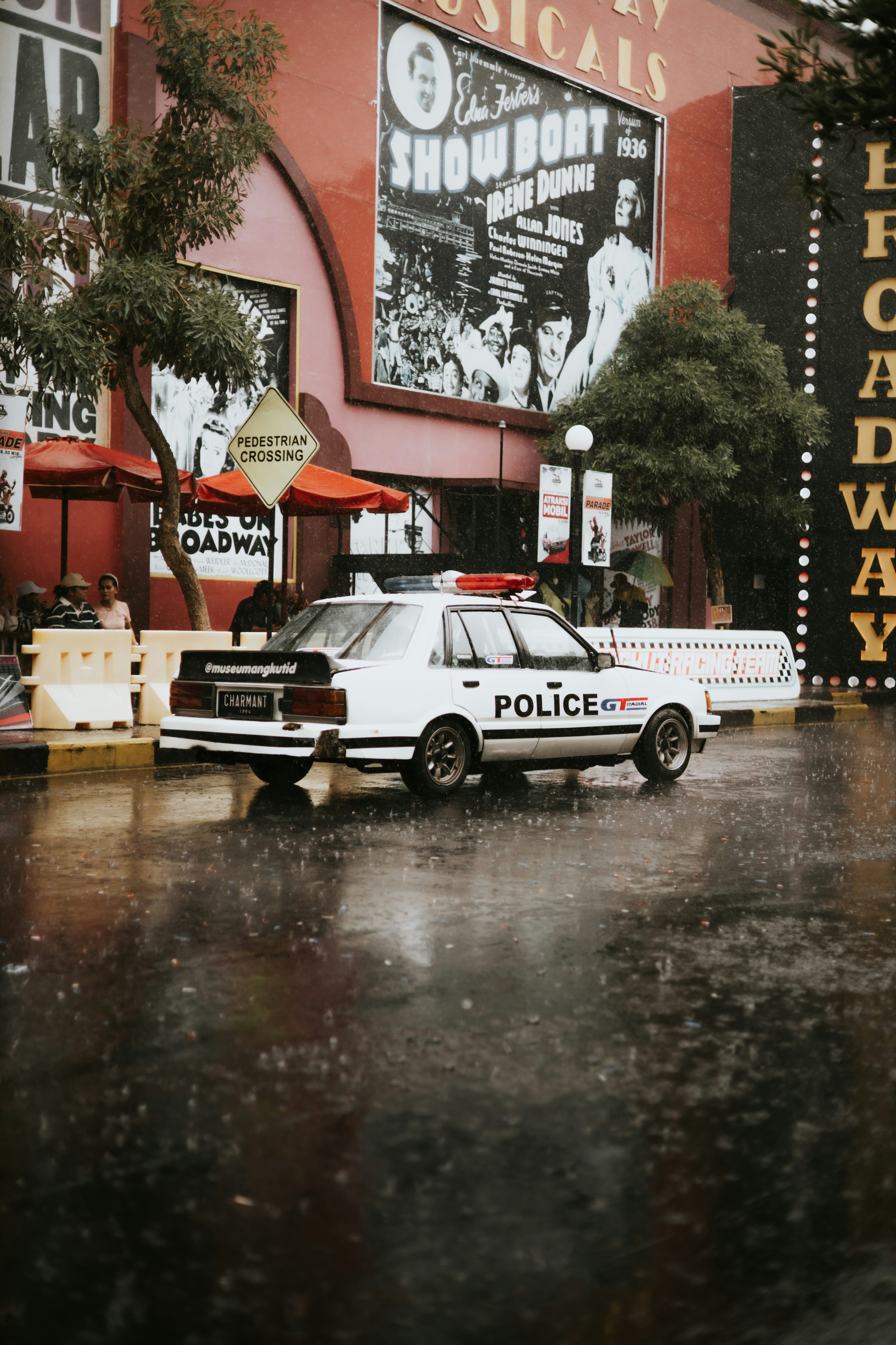 Police Cruiser in Rain: A Night in the Neon District