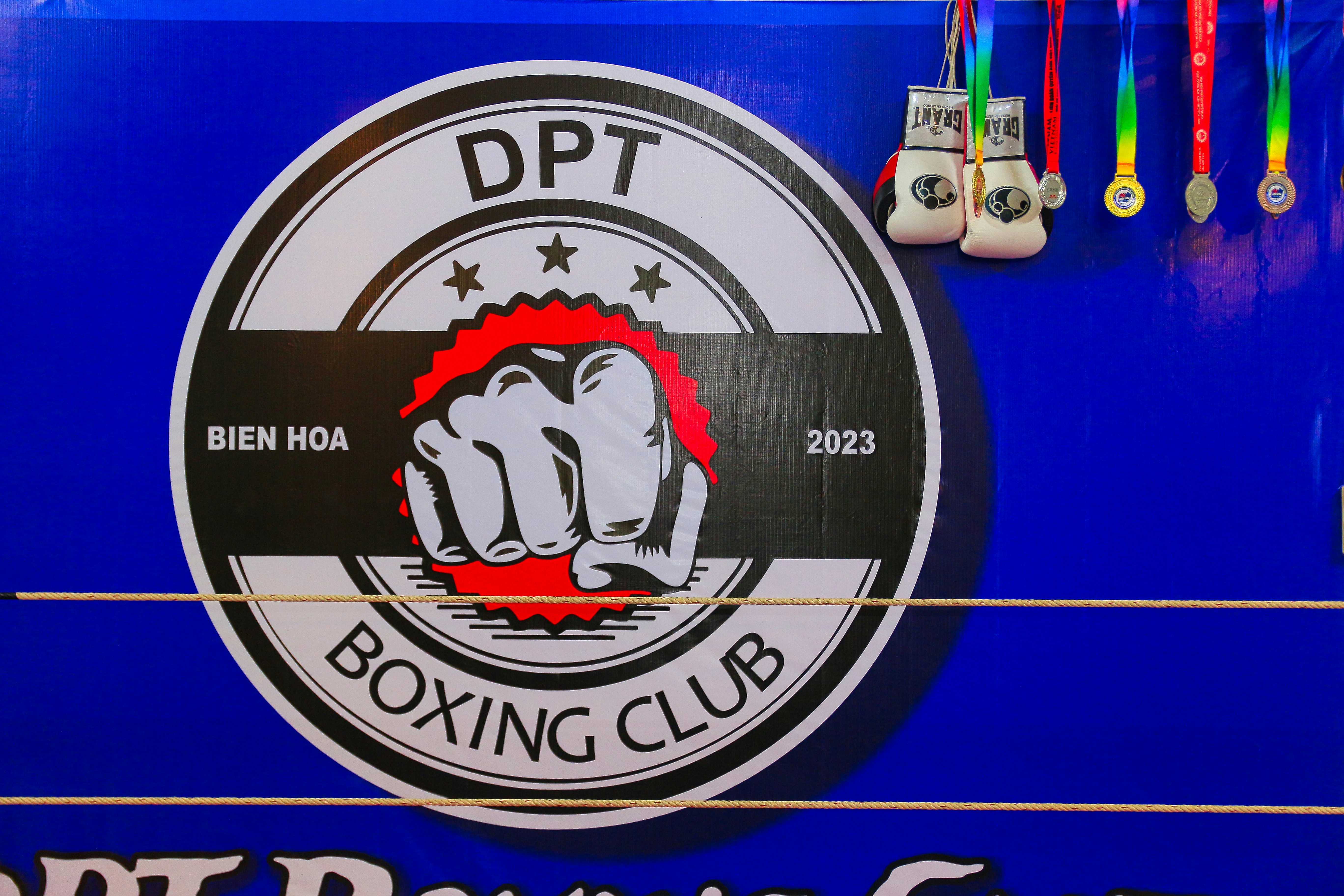 A sign for a boxing club hanging on a wall photo – Free Human Image on ...