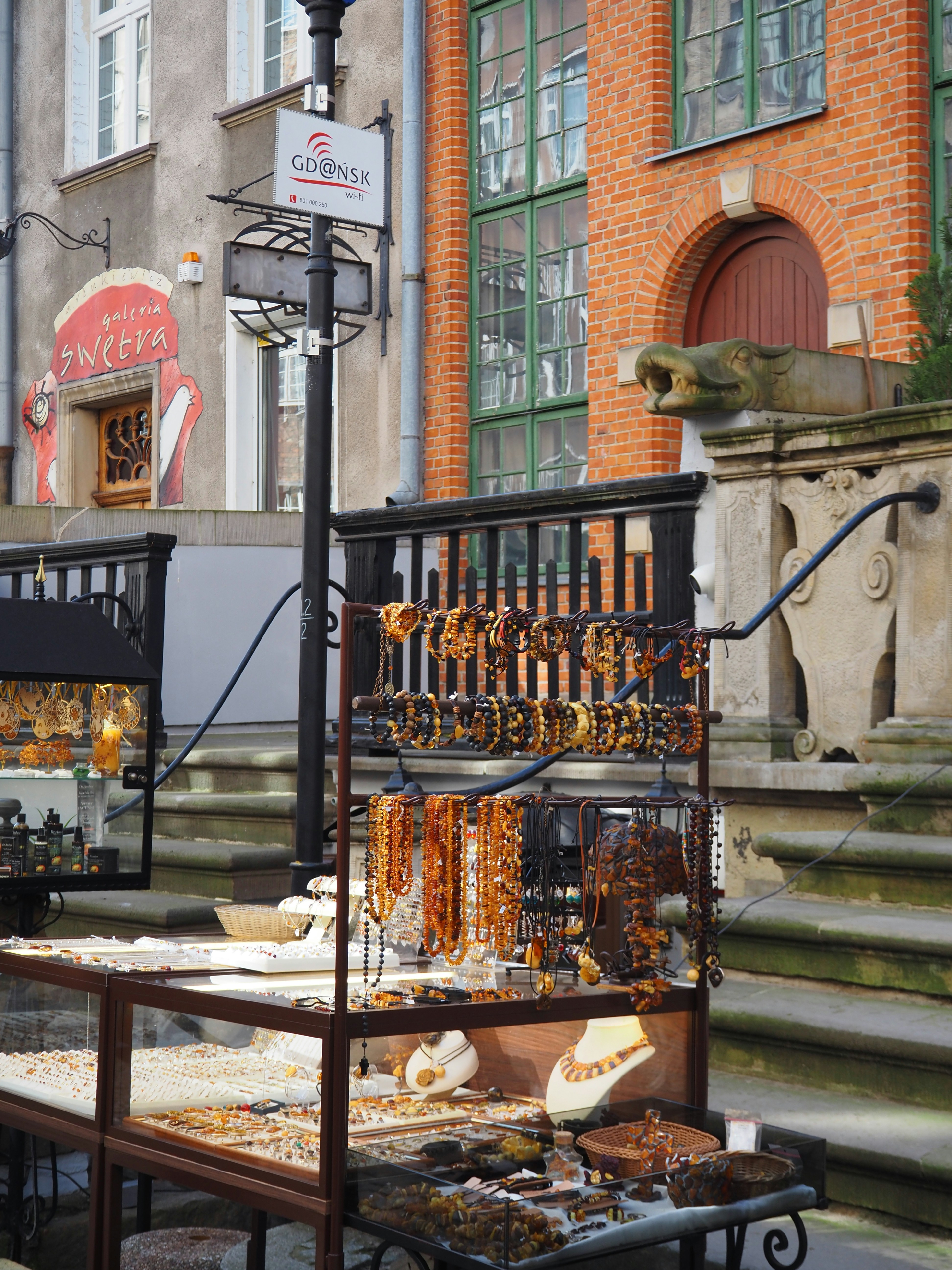 Dragon-Guarded Staircase and a Jewelry Stall: A Sunlit Historic Street Market