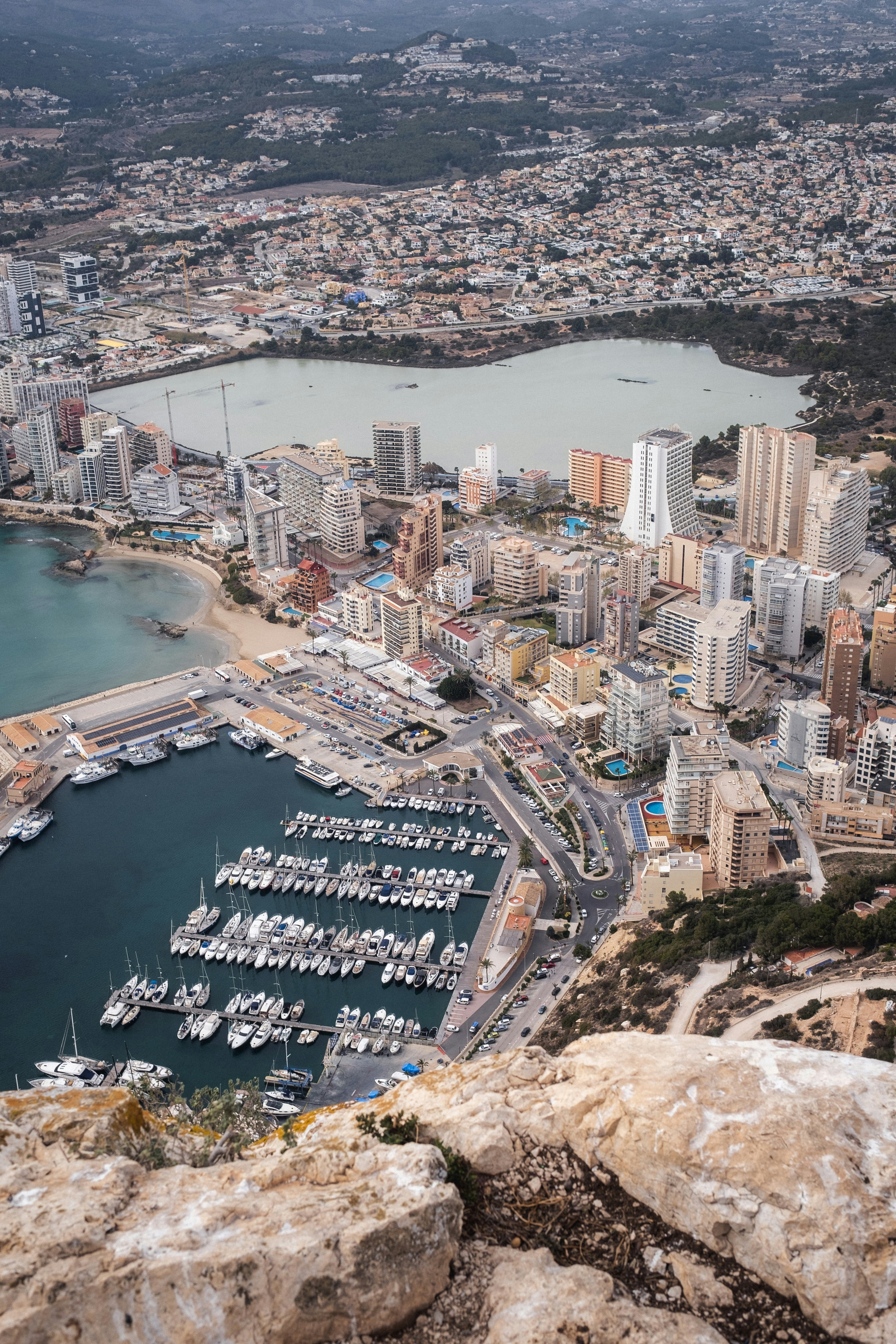 Cliffside Panorama Over a Marina-Fringed City