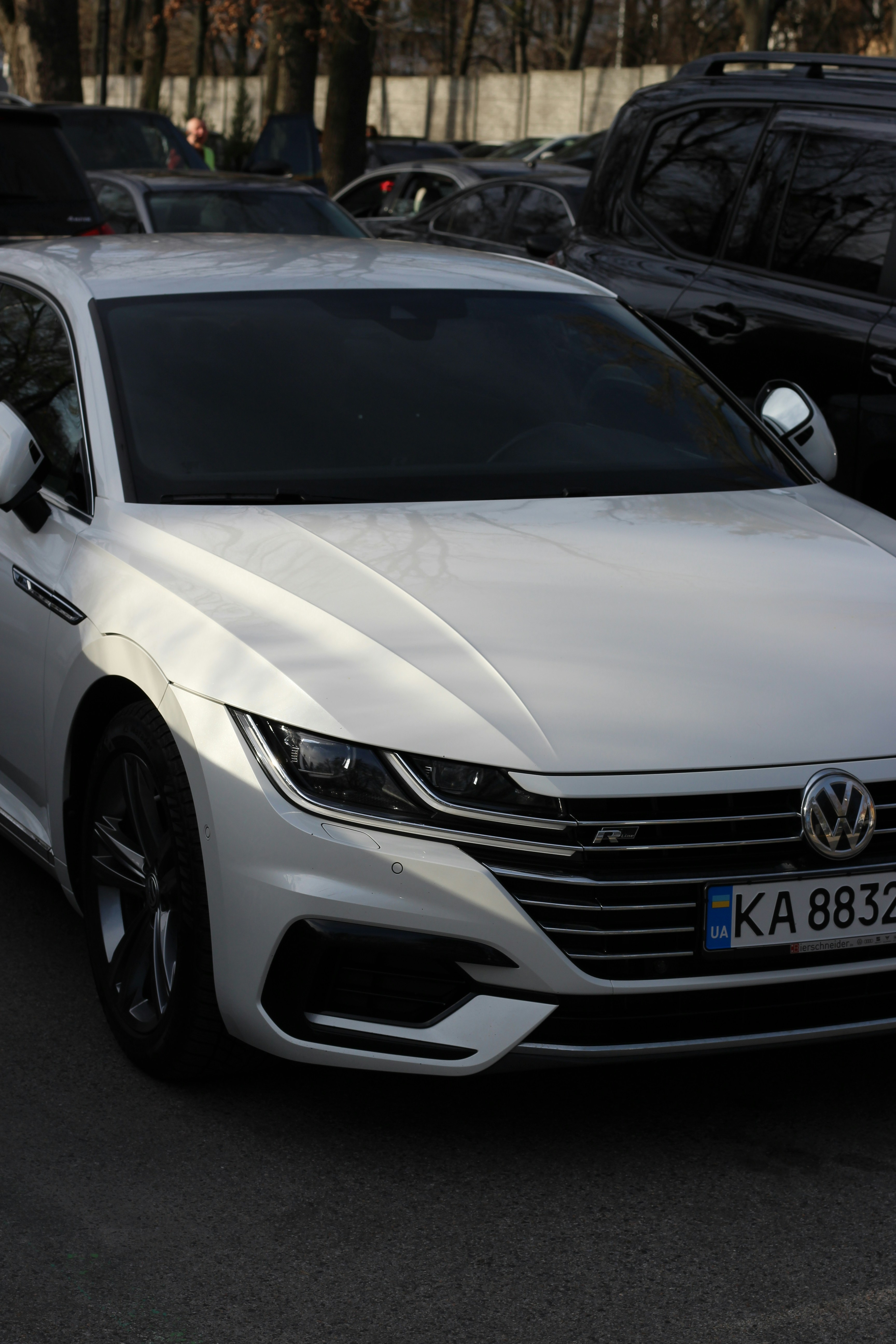 Center-Stage Volkswagen: Crisp White Sedan in a Quiet Parking Lot