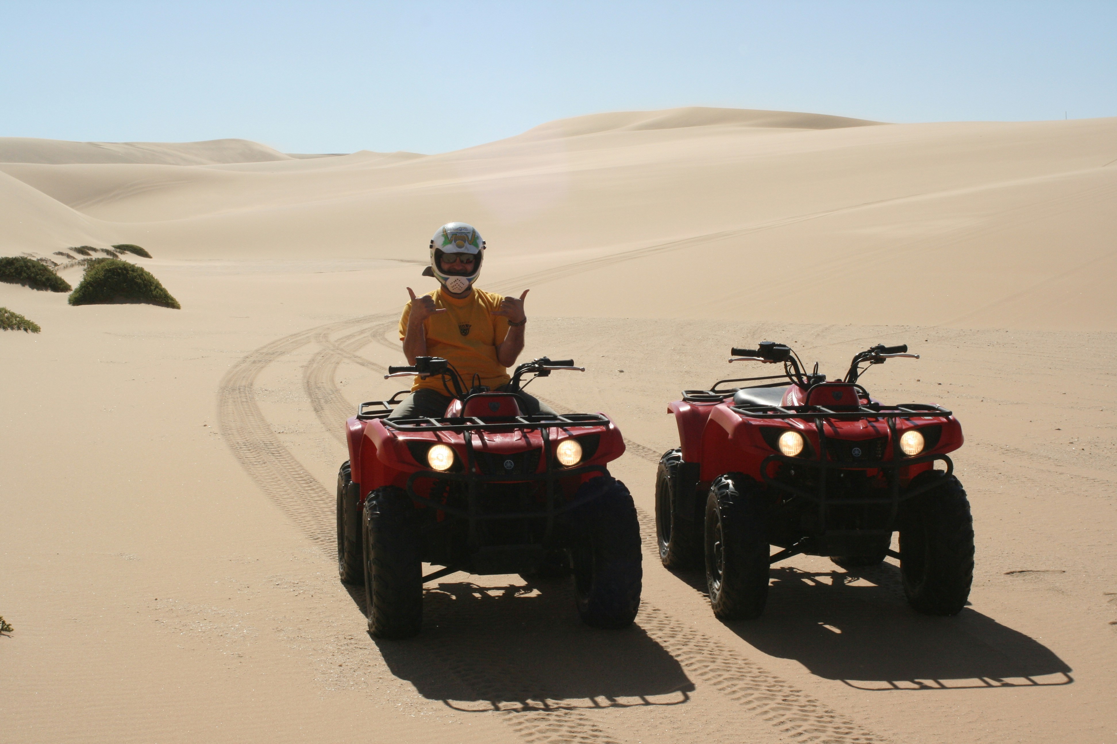 Two people riding four wheelers in the desert photo – Free Namibia ...