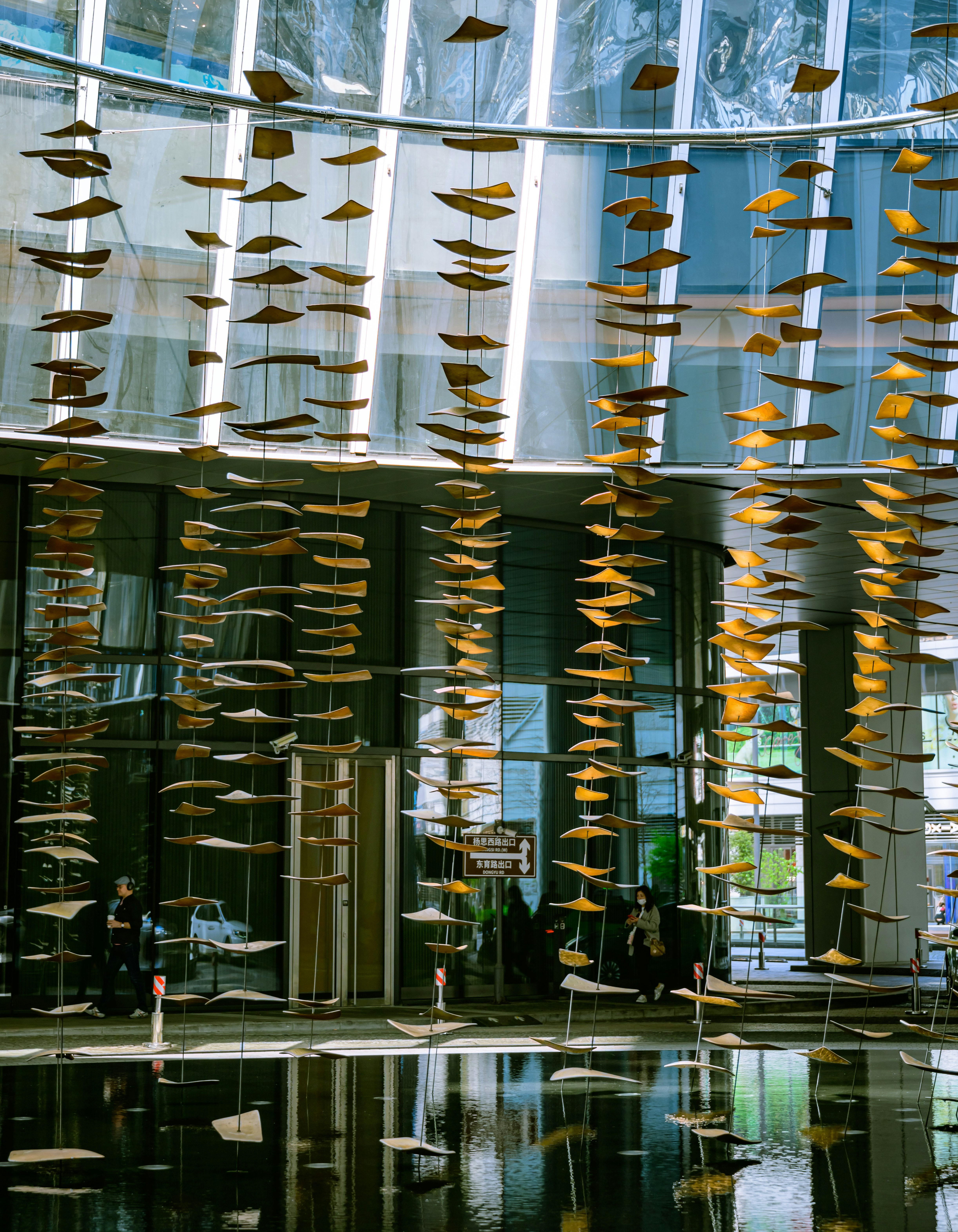 A room filled with lots of tall glass windows photo – Free China Image ...