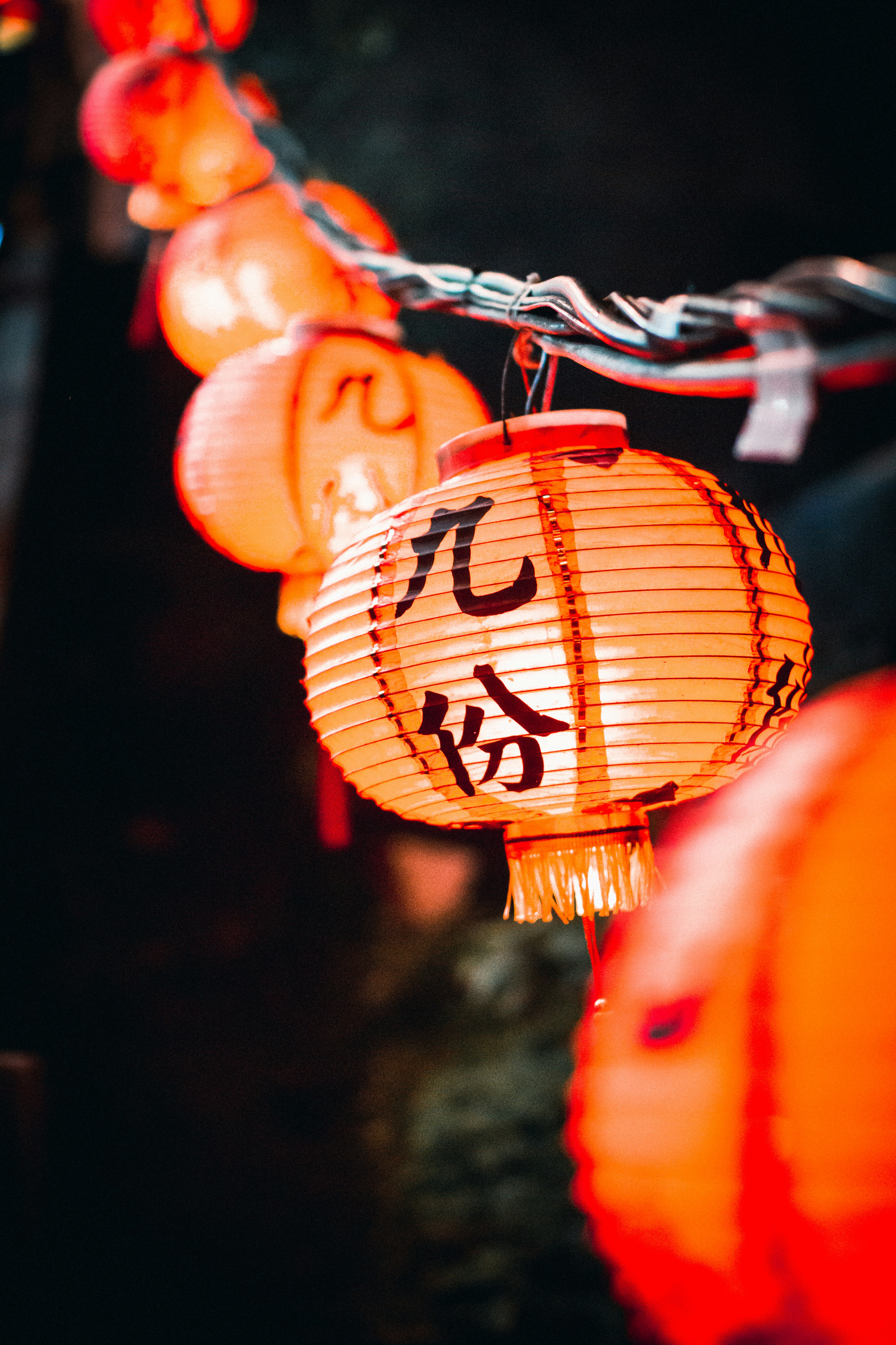 A string of chinese lanterns with writing on them photo – Free Taiwan ...