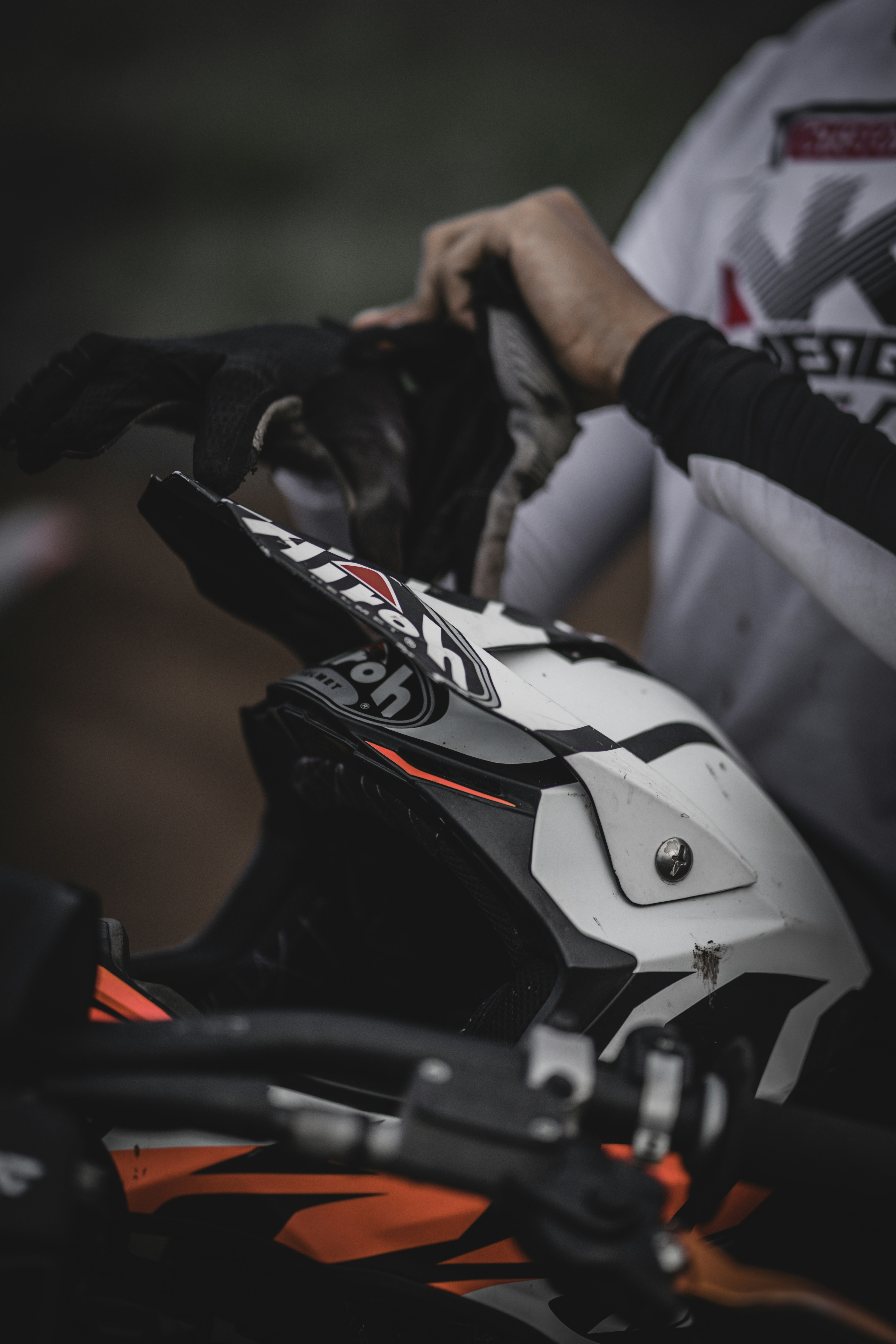 A close up of a person holding a motorcycle helmet photo – Free Hand ...