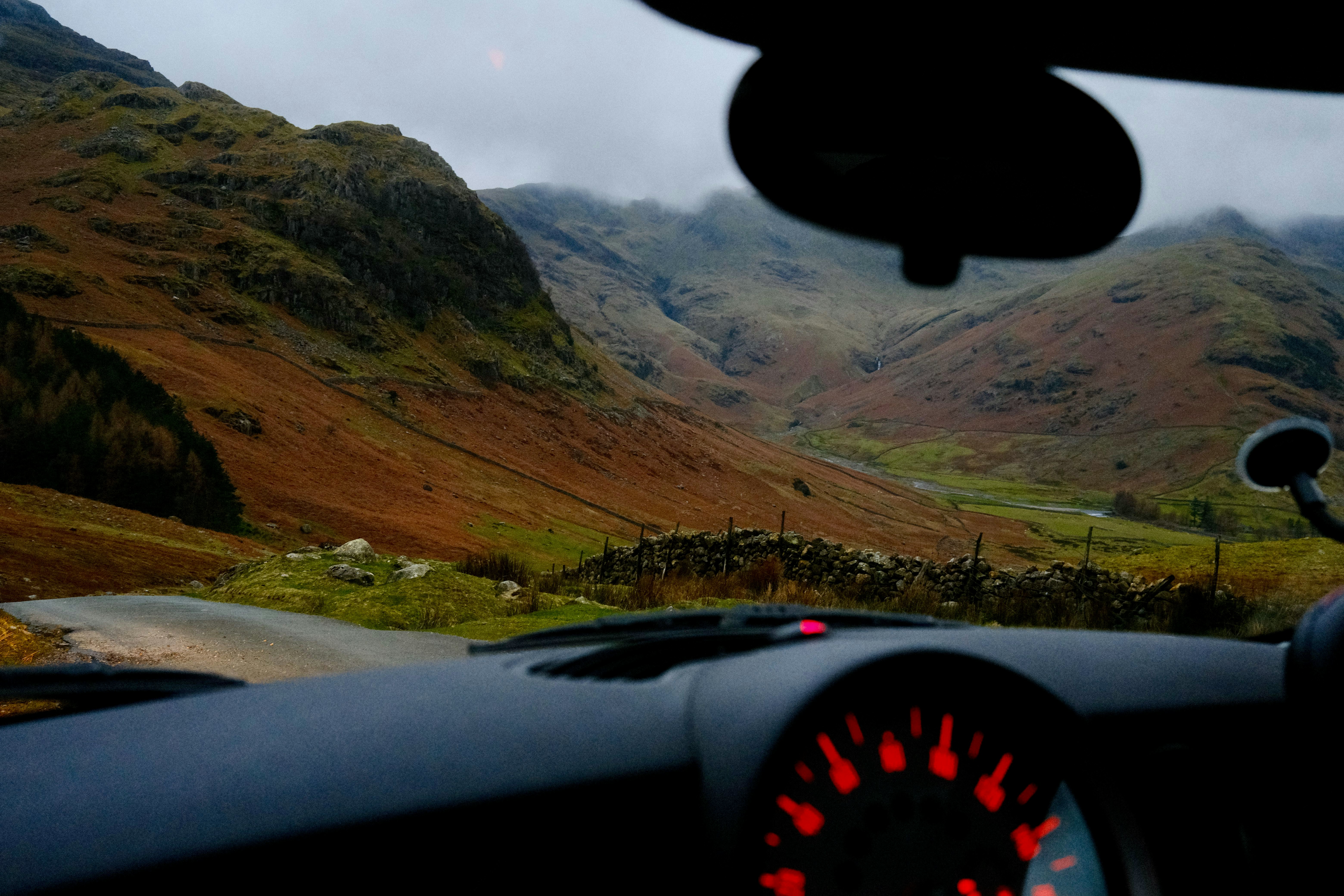 Highland Road Reverie: A Car-Window View Through Misty Valleys