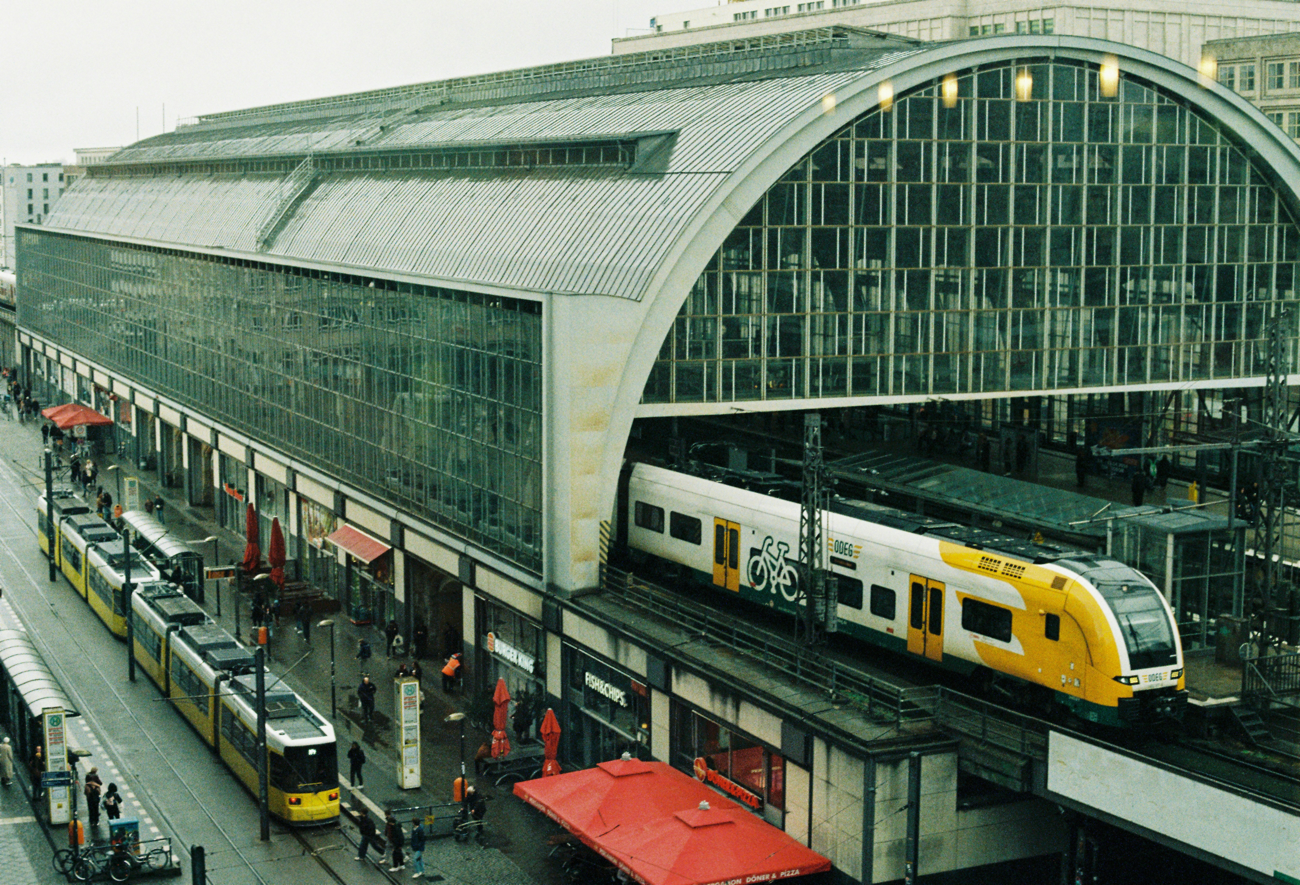 A train on a train track near a train station photo – Free Train Image ...