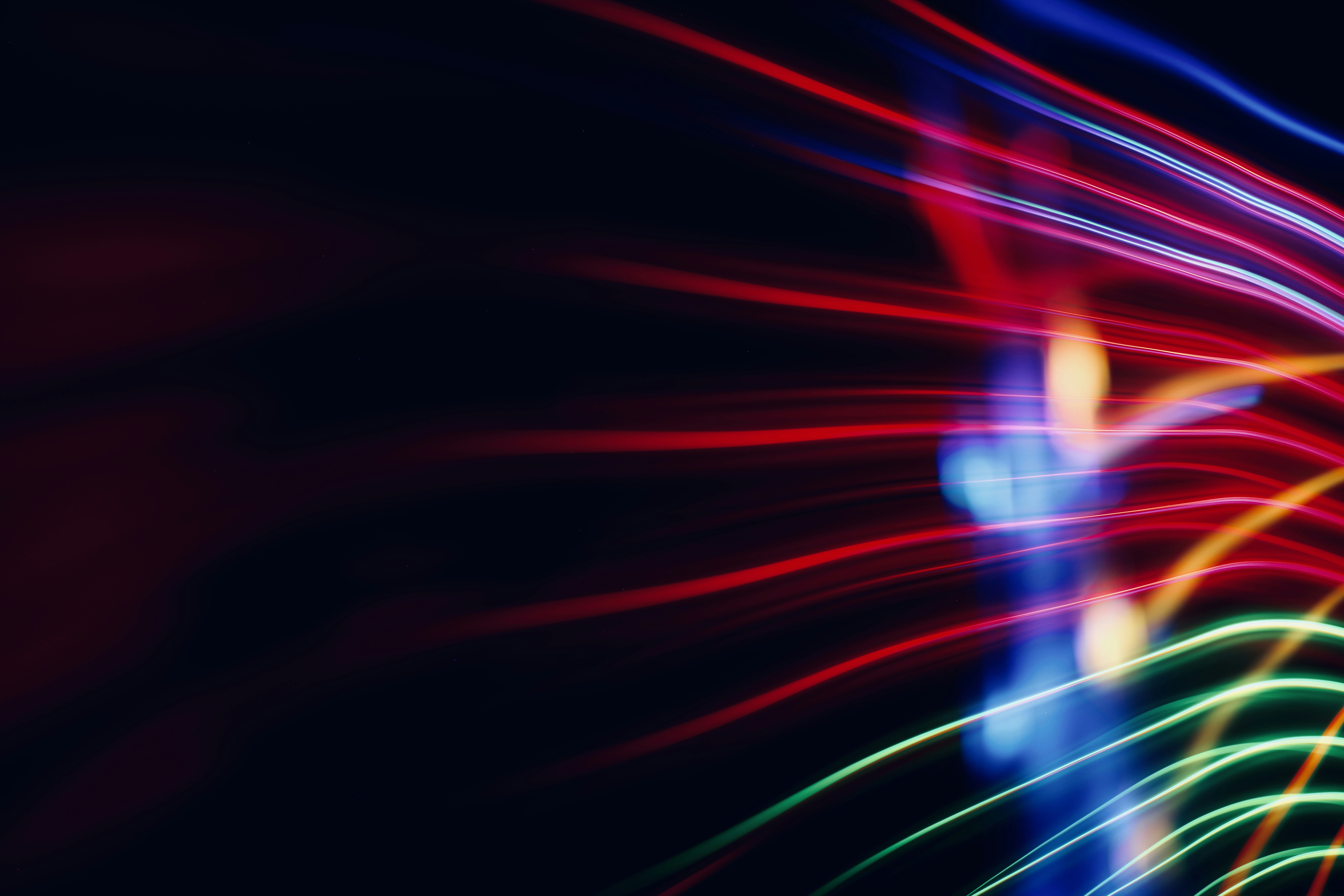 A blurry photo of a person with a cell phone photo – Free Curved lines ...