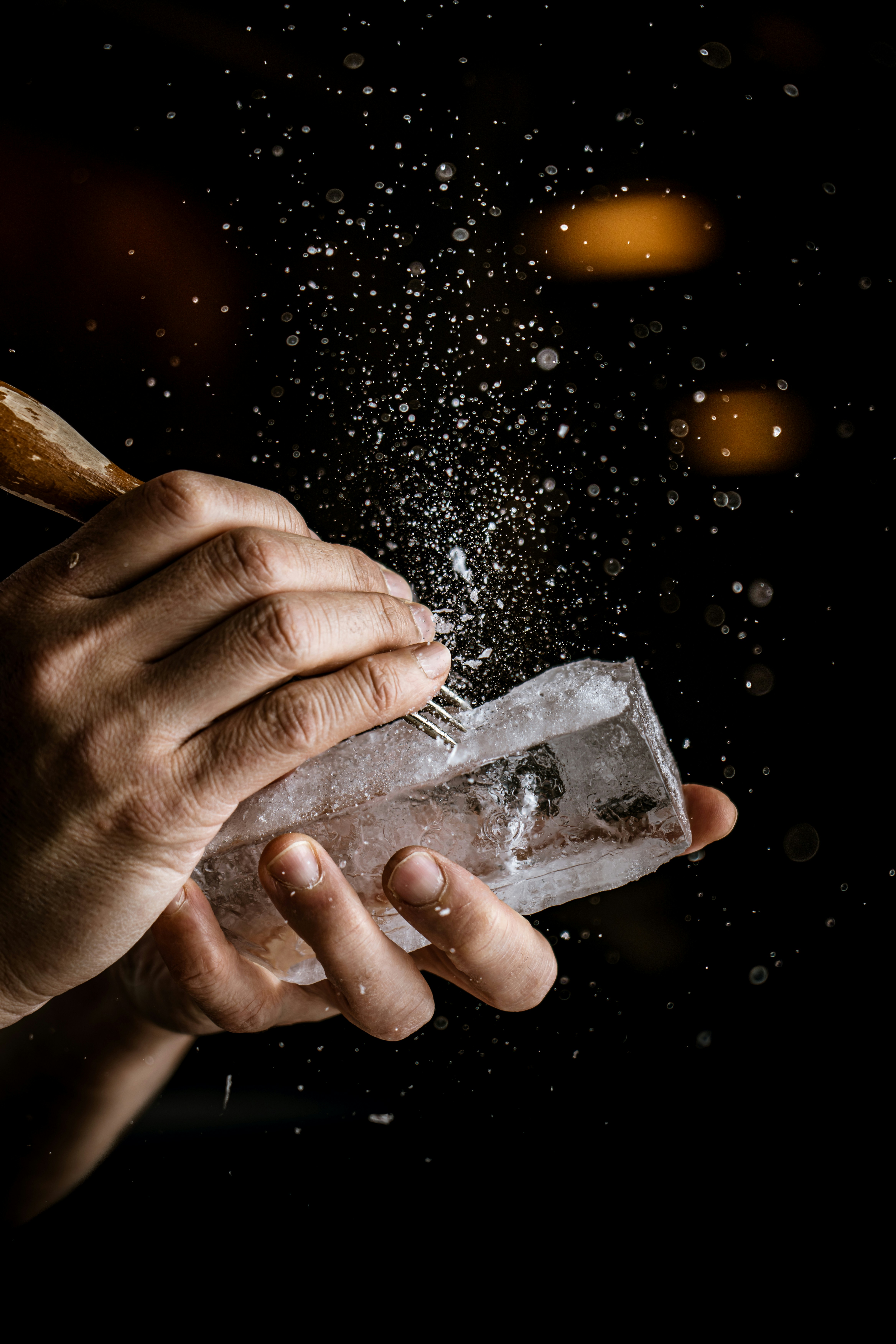 A person holding an ice block in their hand photo – Free A7iv Image on ...