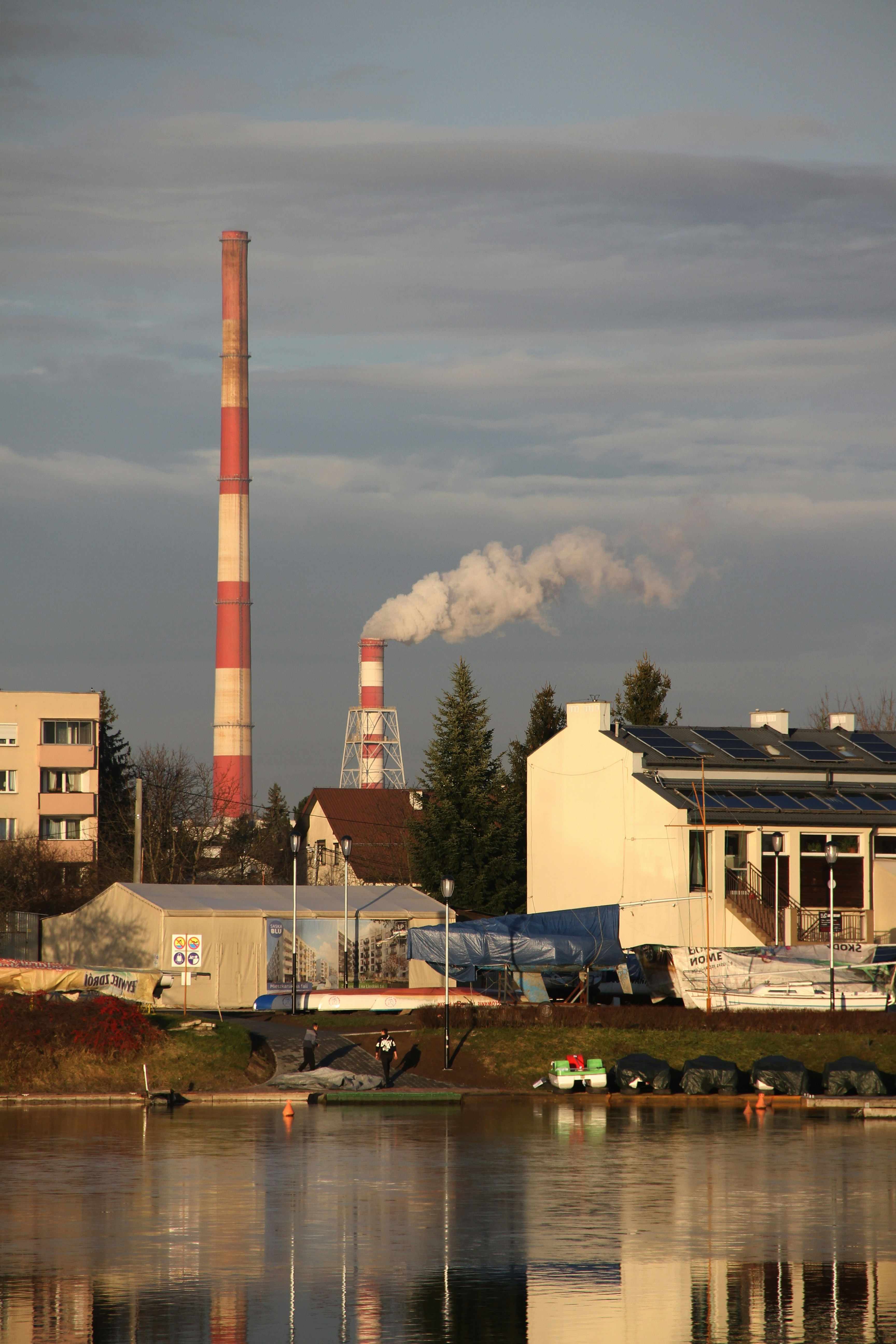 Industrial Skyline and Steam: Quiet Reflections by the River